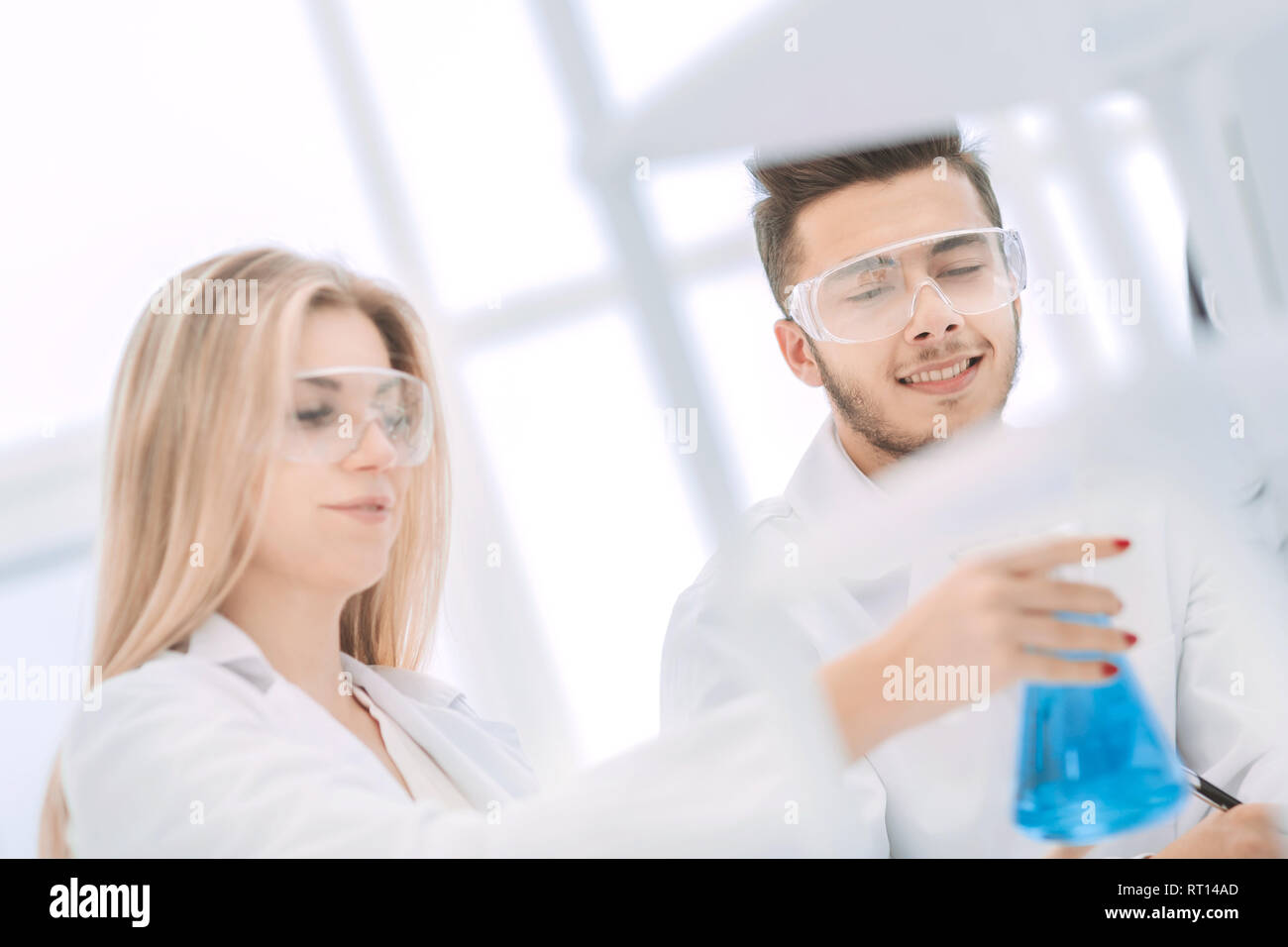 Smiling scientist showing laboratory hi-res stock photography and ...