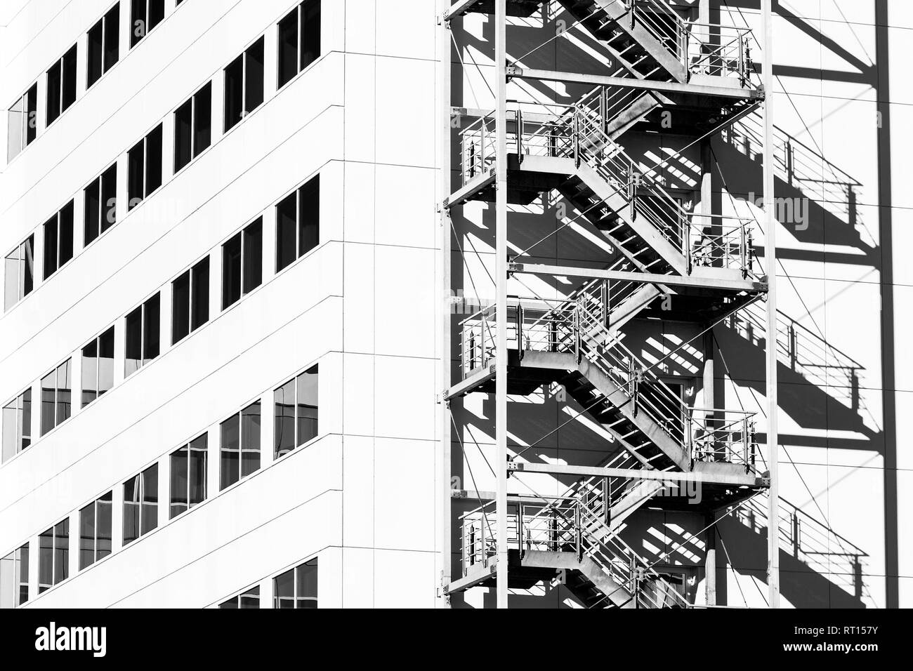 modern architecture white high rise office building with shadow of ...