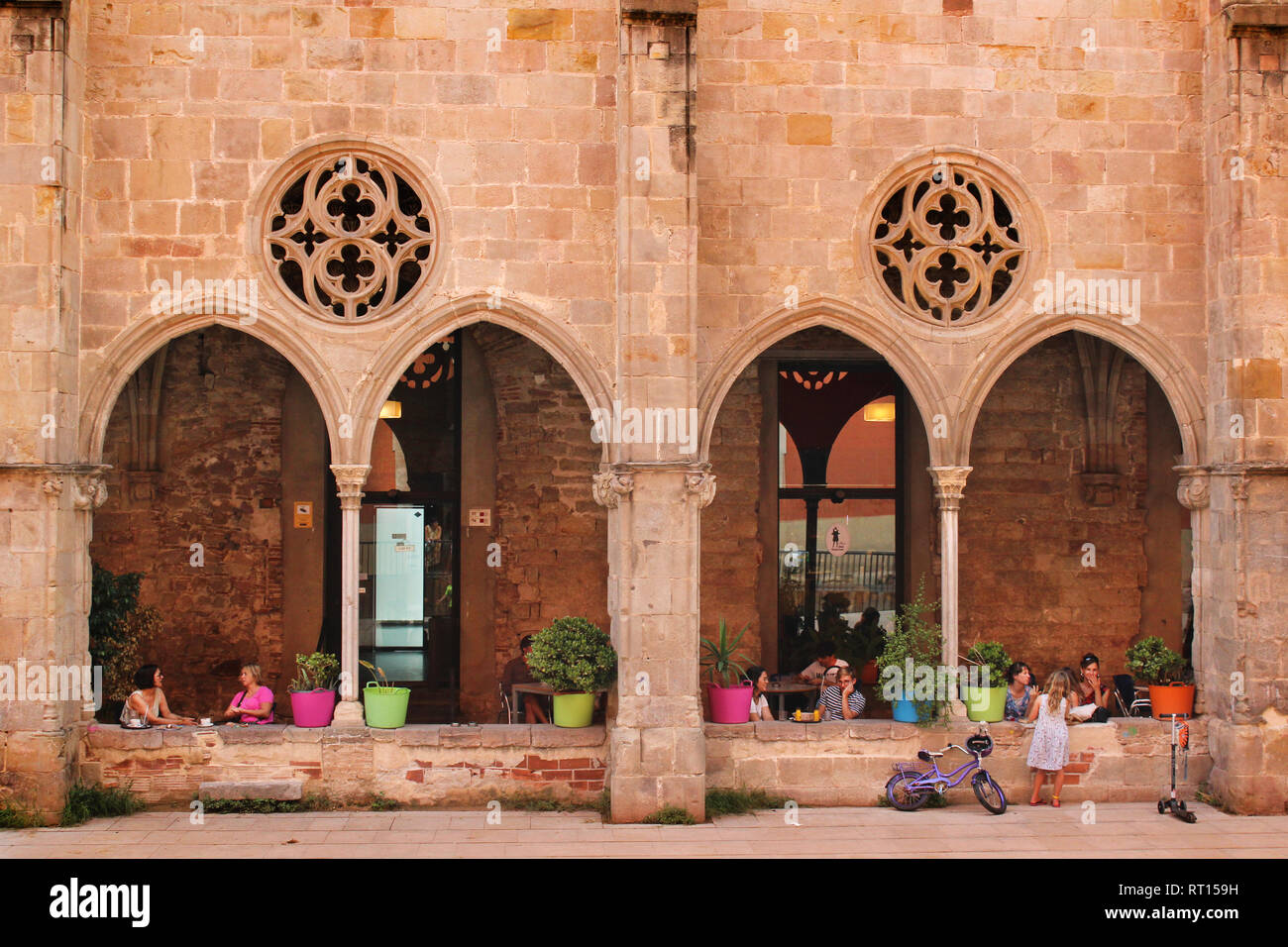 Scene in bar terrace inside of Convent de Sant Agustí building, El Born ...