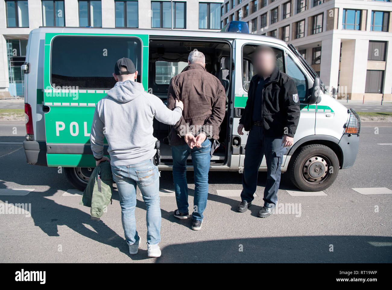 Plain clothes police officers hi-res stock photography and images - Alamy