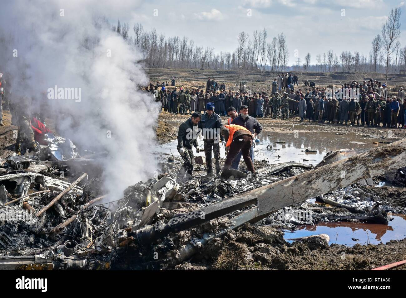Budgam, Kashmir. 27th February, 2019. Rescue workers inspect the ...