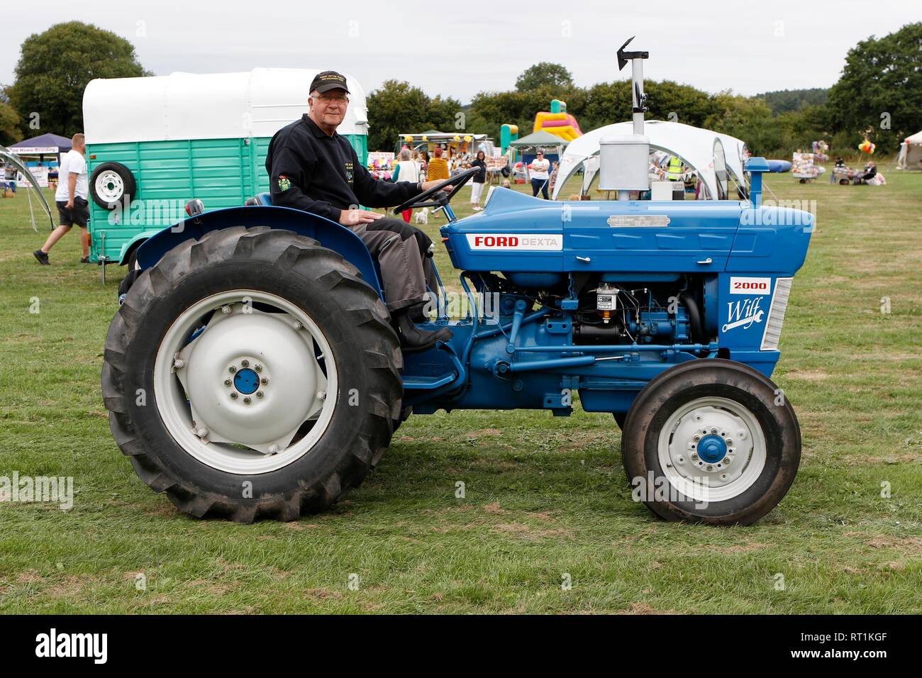 A classic blue Ford tractor in the Ruardean Carnival procession, in the ...