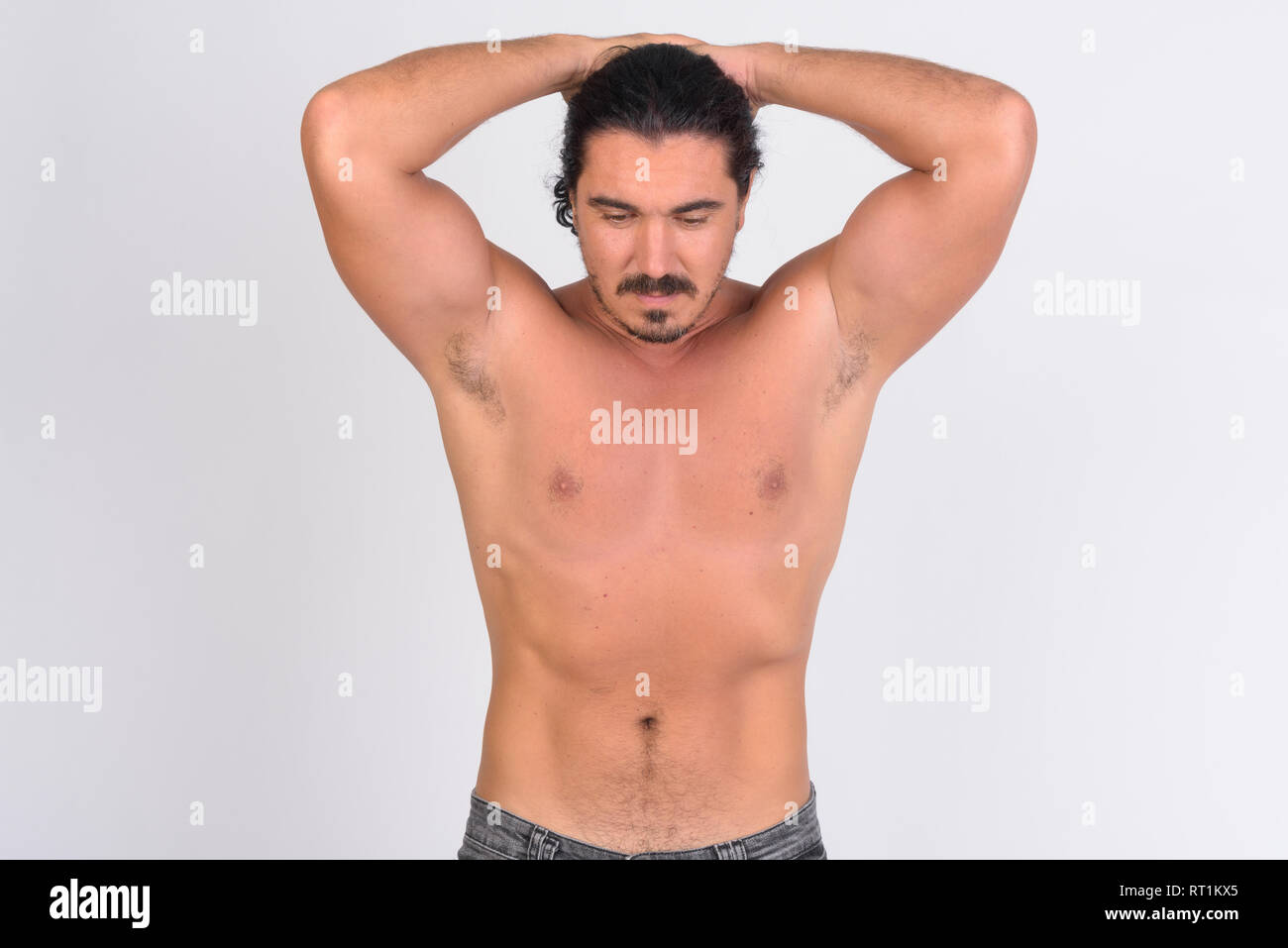 Shirtless handsome macho man with mustache flexing abs Stock Photo - Alamy