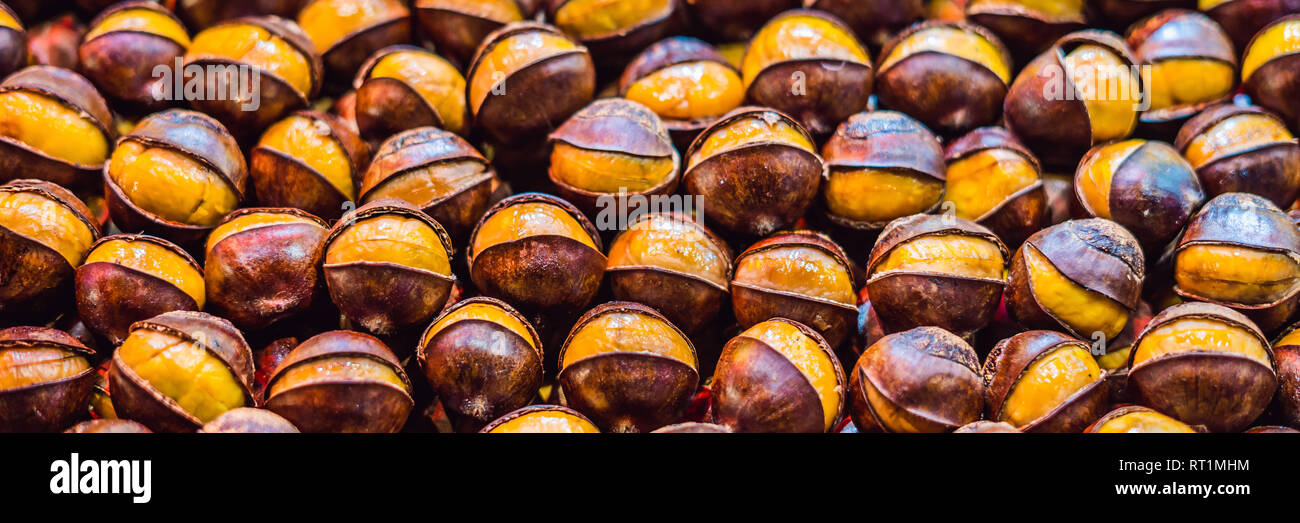 Bunch of roasted chestnuts at street wendor. Roasted Chestnuts, Street ...