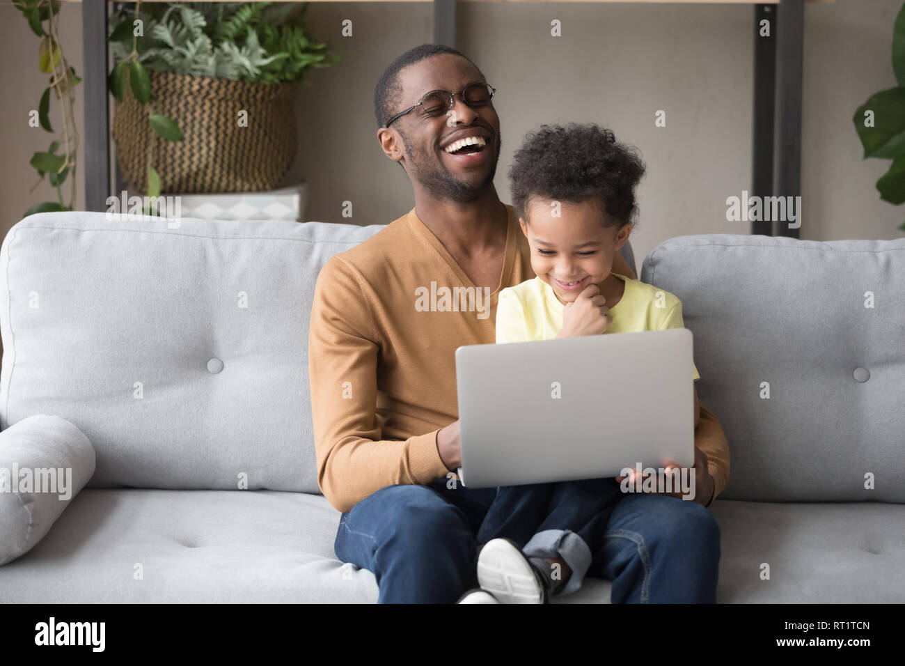 African kid computer hi-res stock photography and images - Alamy