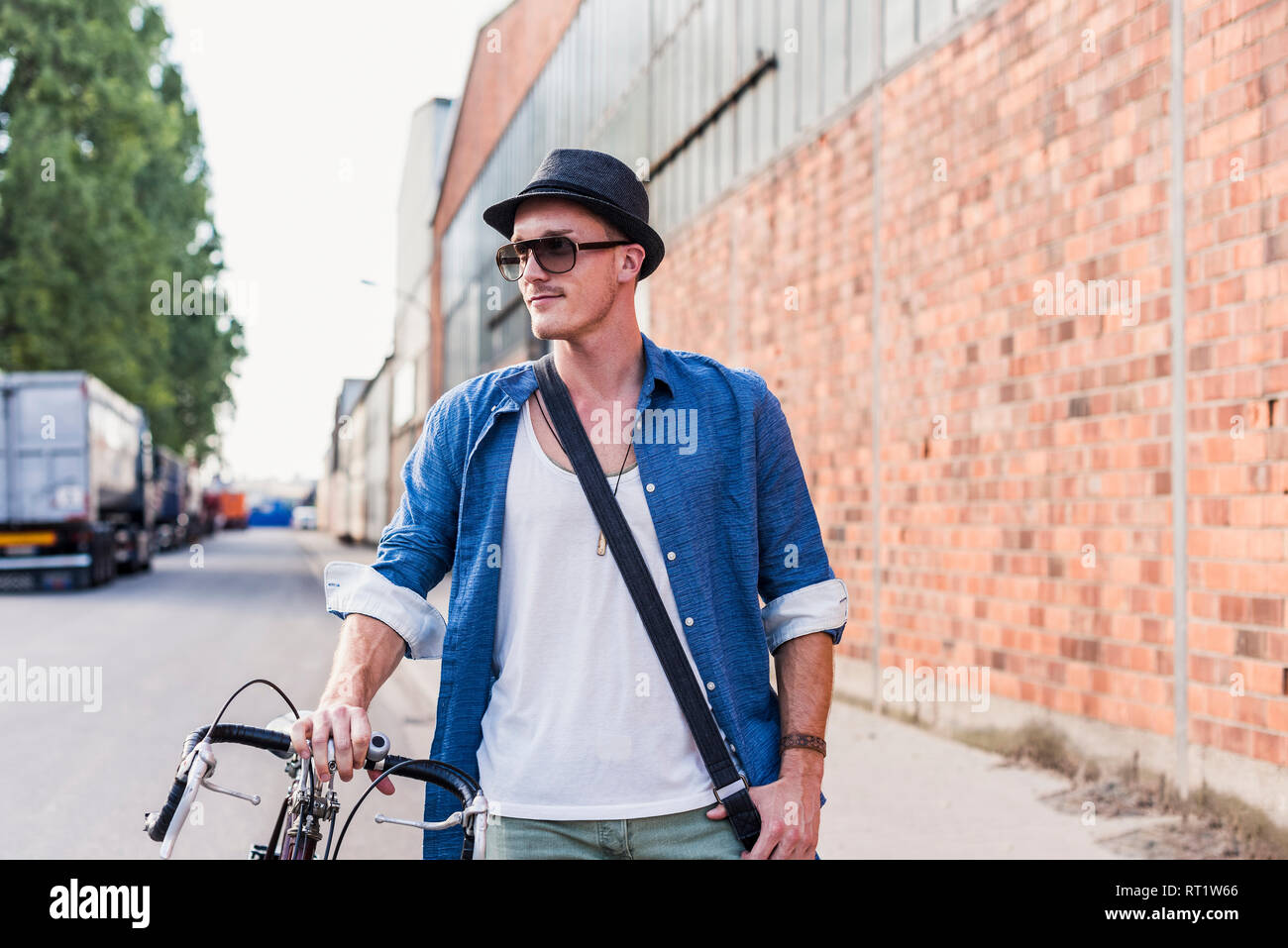 Man walking away street cool hi-res stock photography and images - Alamy
