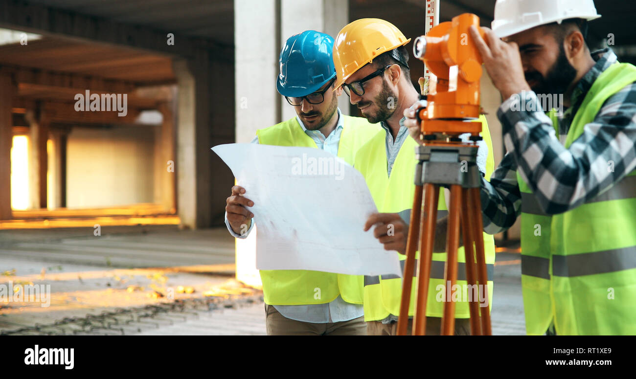 People working together build building hi-res stock photography and ...