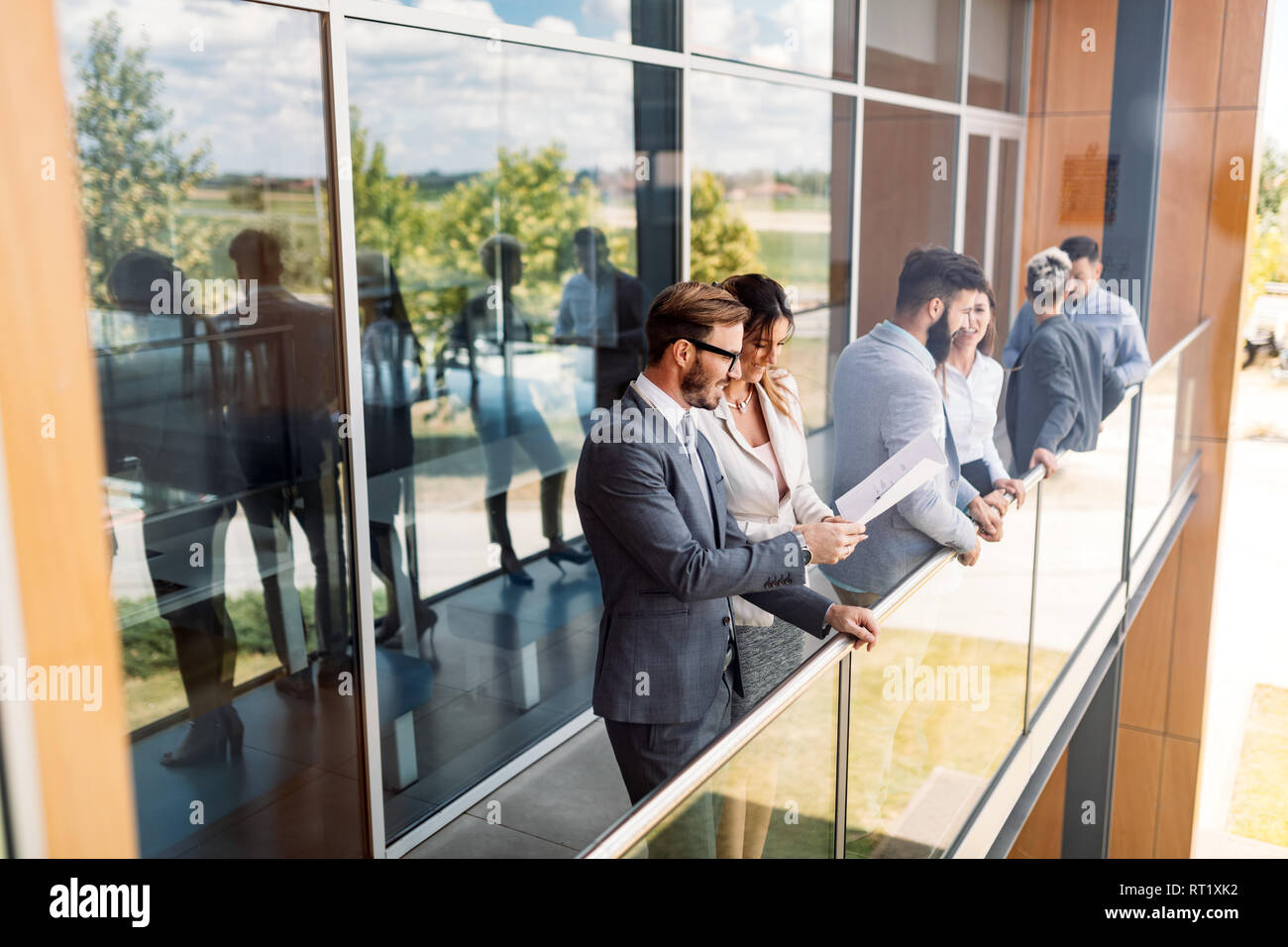 Business people talking outdoor Stock Photo - Alamy