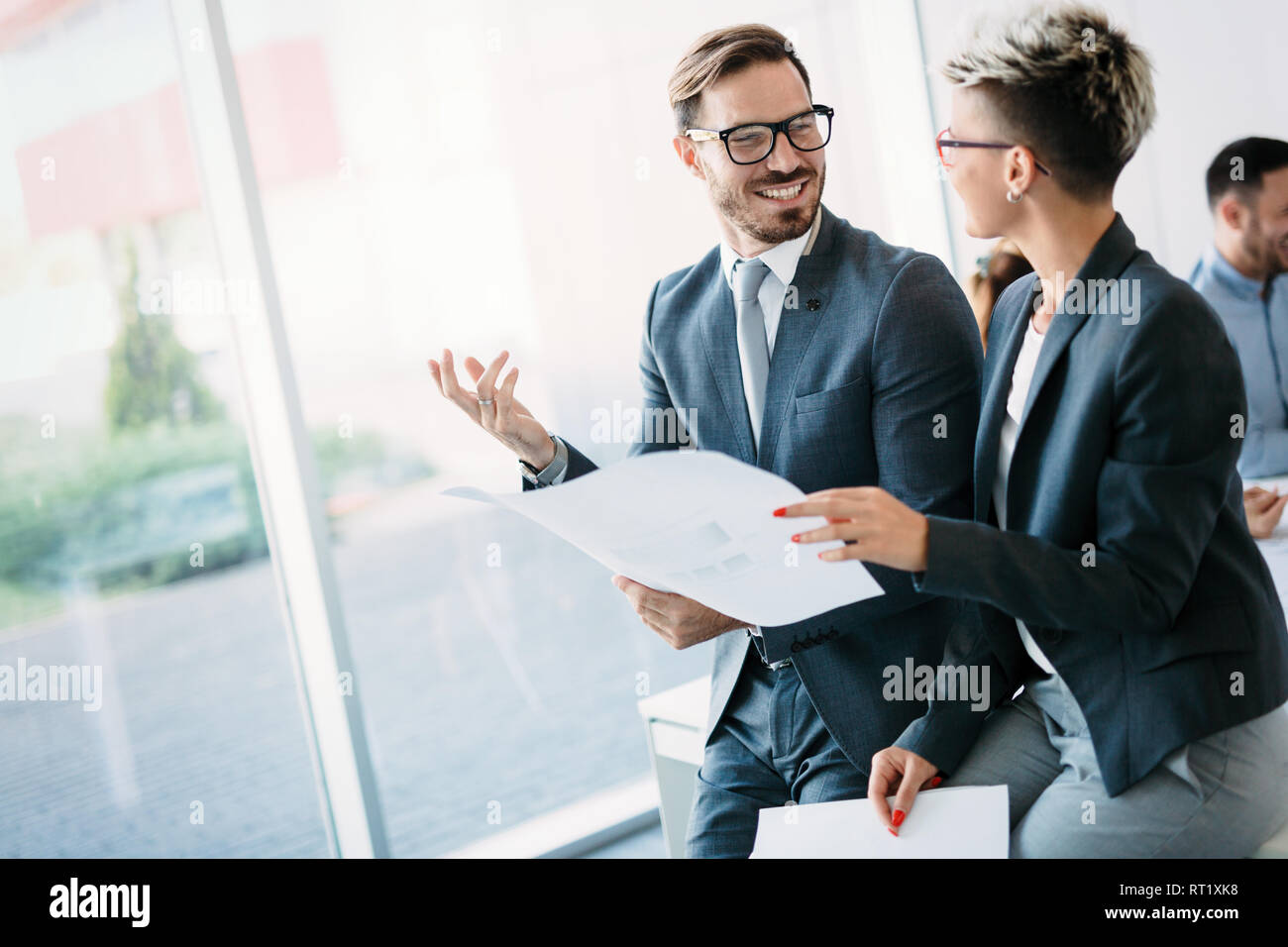 Group of business people collaborating in office Stock Photo - Alamy