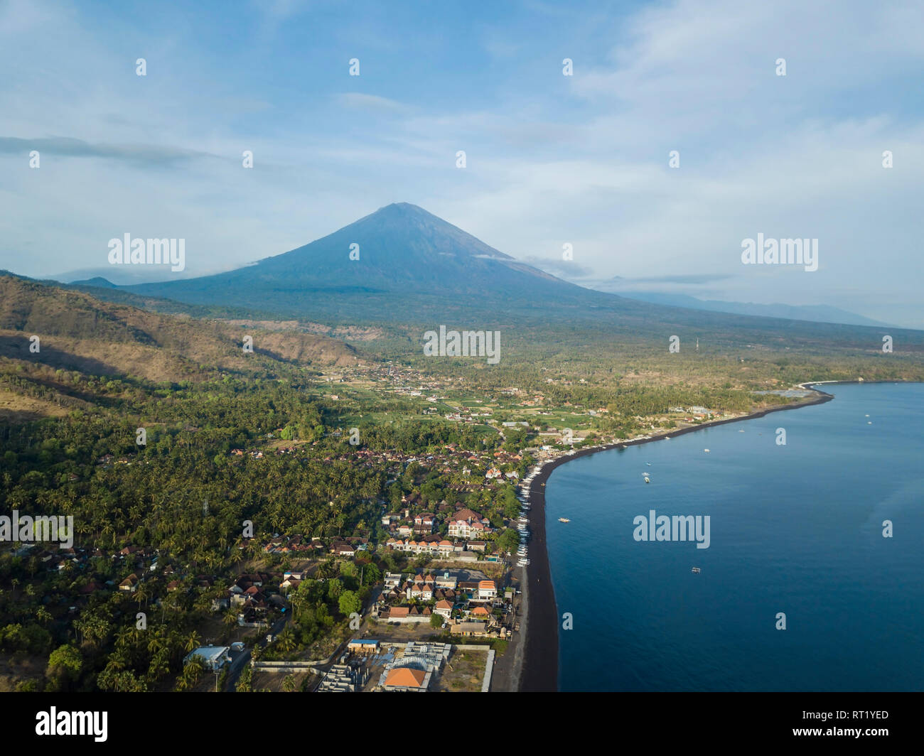 Indonesia, Bali, Amed, Aerial view of Amed beach and volcano Agung ...