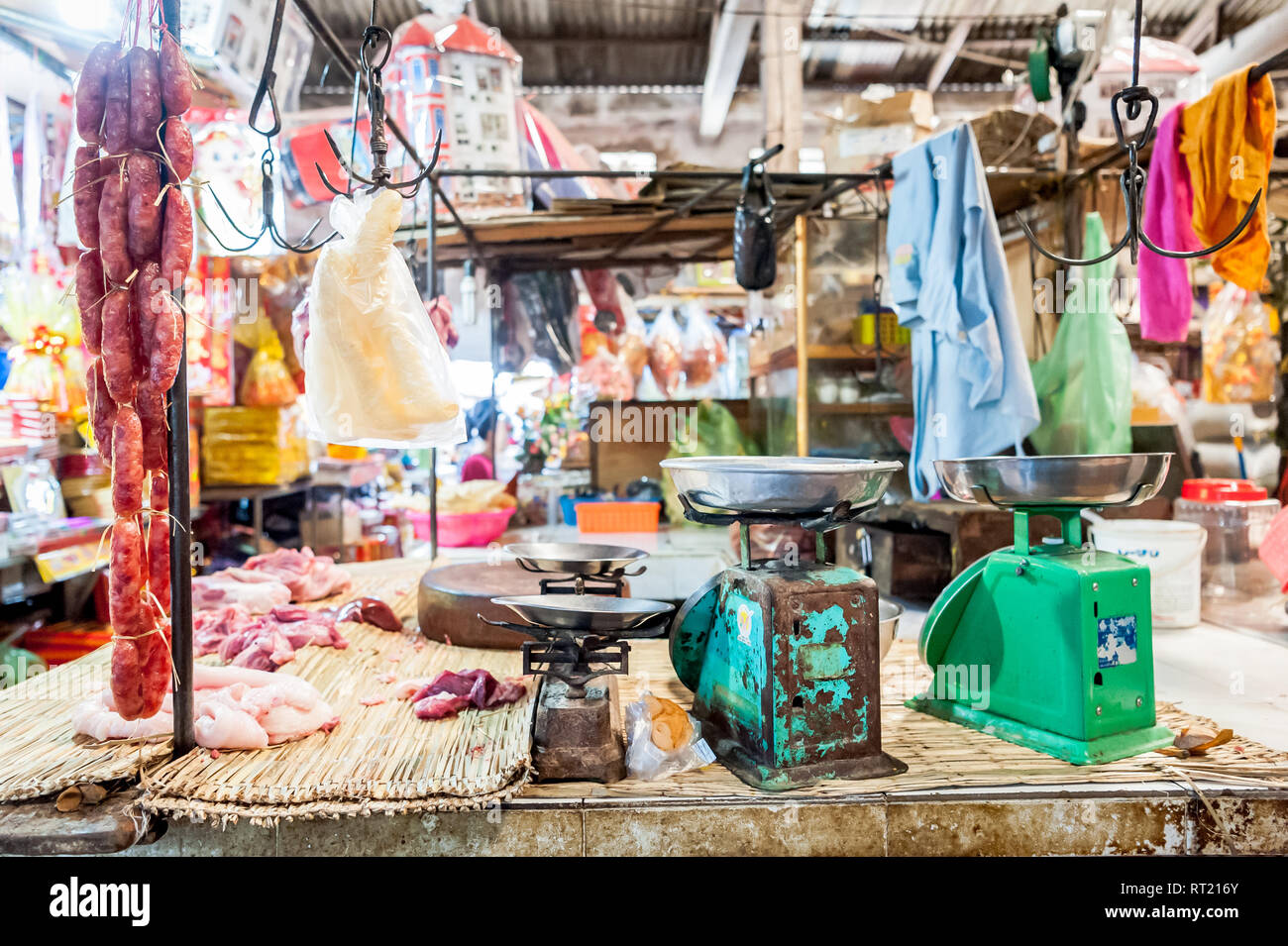 Scenes inside a very cramped, cheap market in Phnom Penh Cambodia. Its ...
