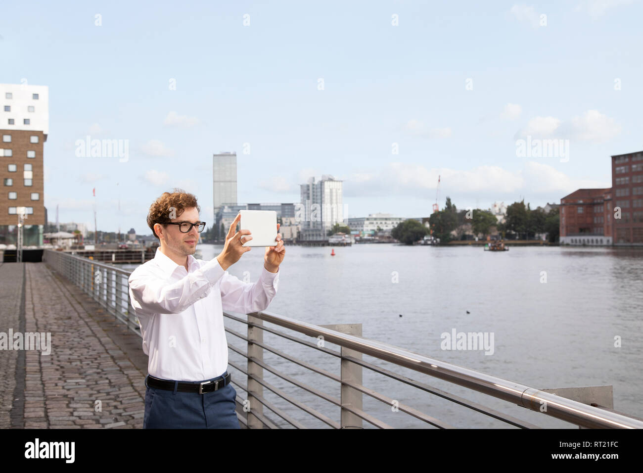 Businessman taking photo digital tablet hi-res stock photography and ...