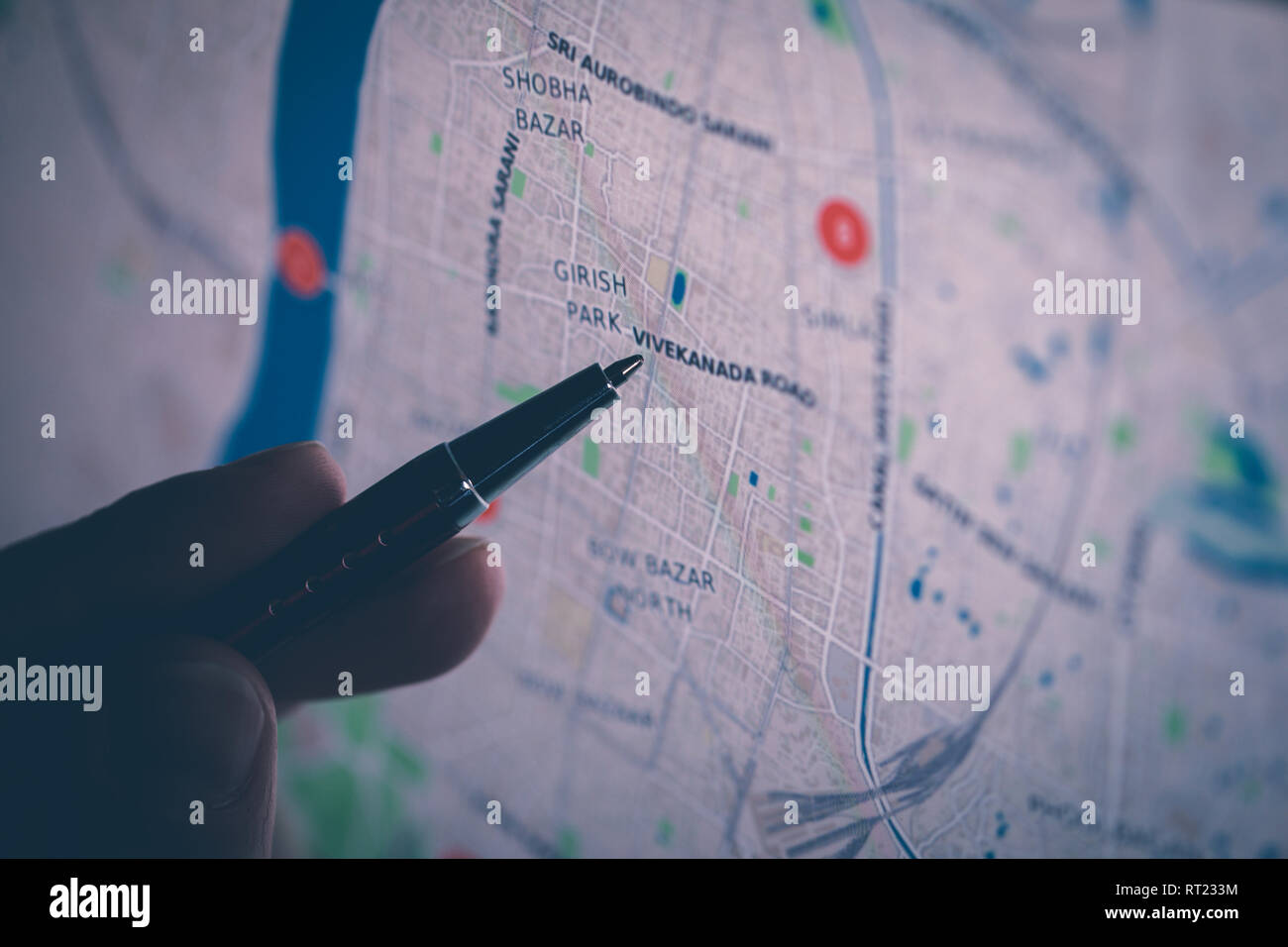 Finger pointing route on map hi-res stock photography and images - Alamy