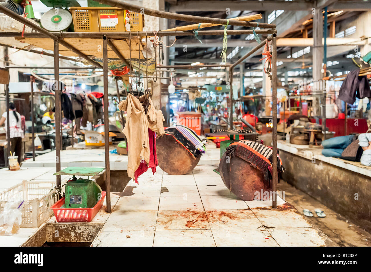 Scenes inside a very cramped, cheap market in Phnom Penh Cambodia. Its ...