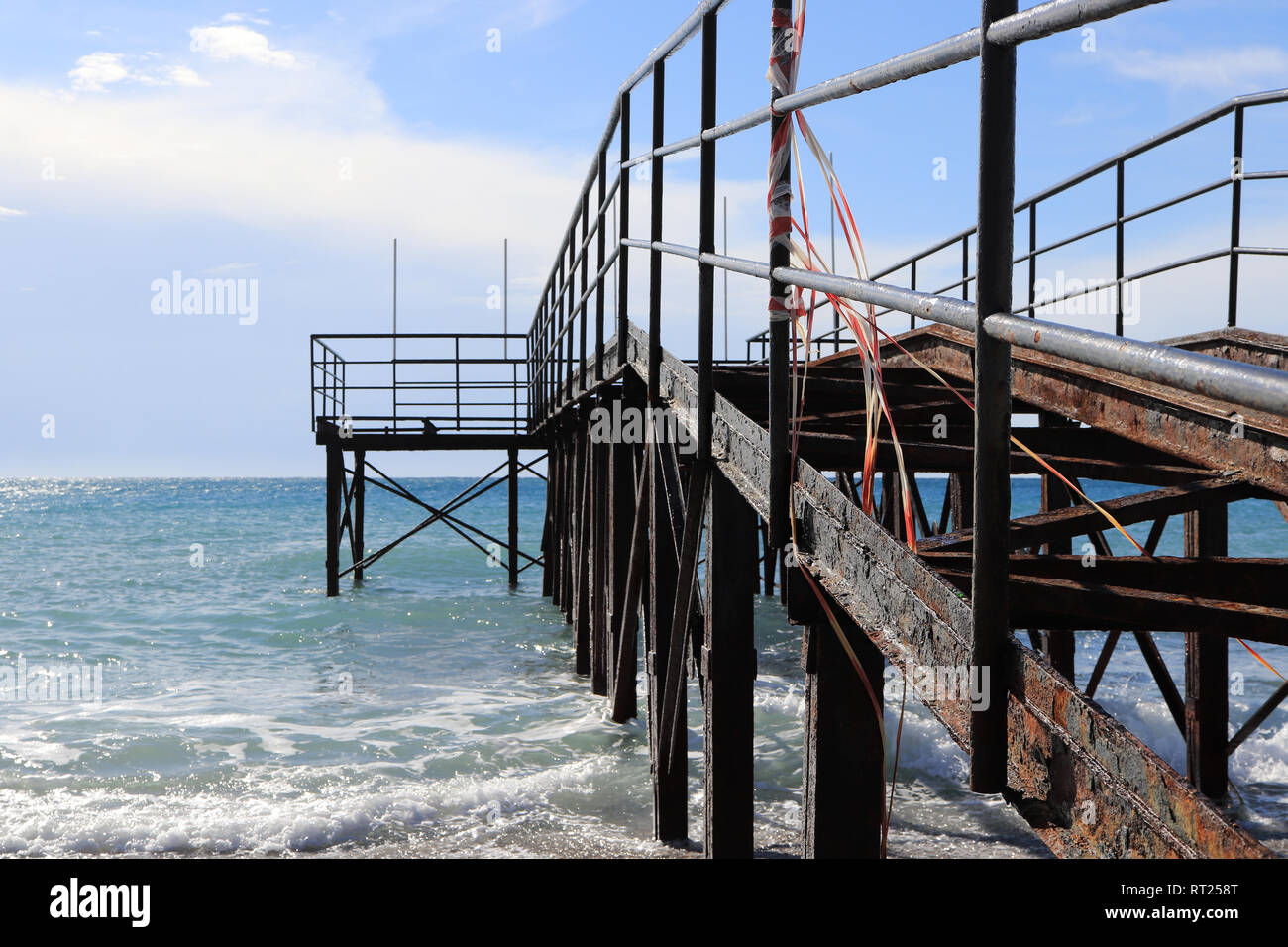 Hard rust pier construction on the Alanya beach Stock Photo - Alamy