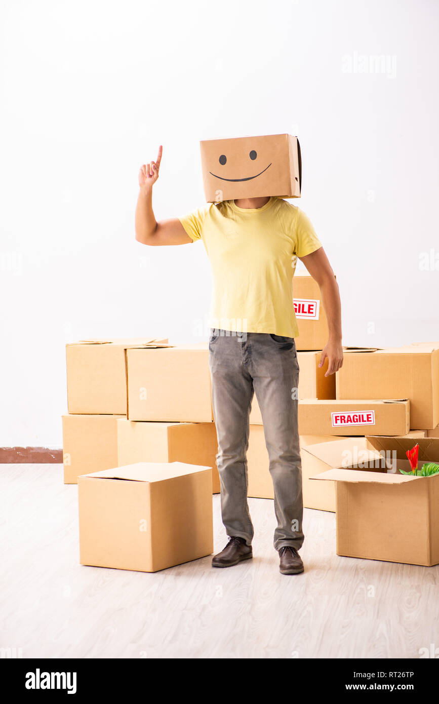 Happy man with box instead of his head Stock Photo - Alamy