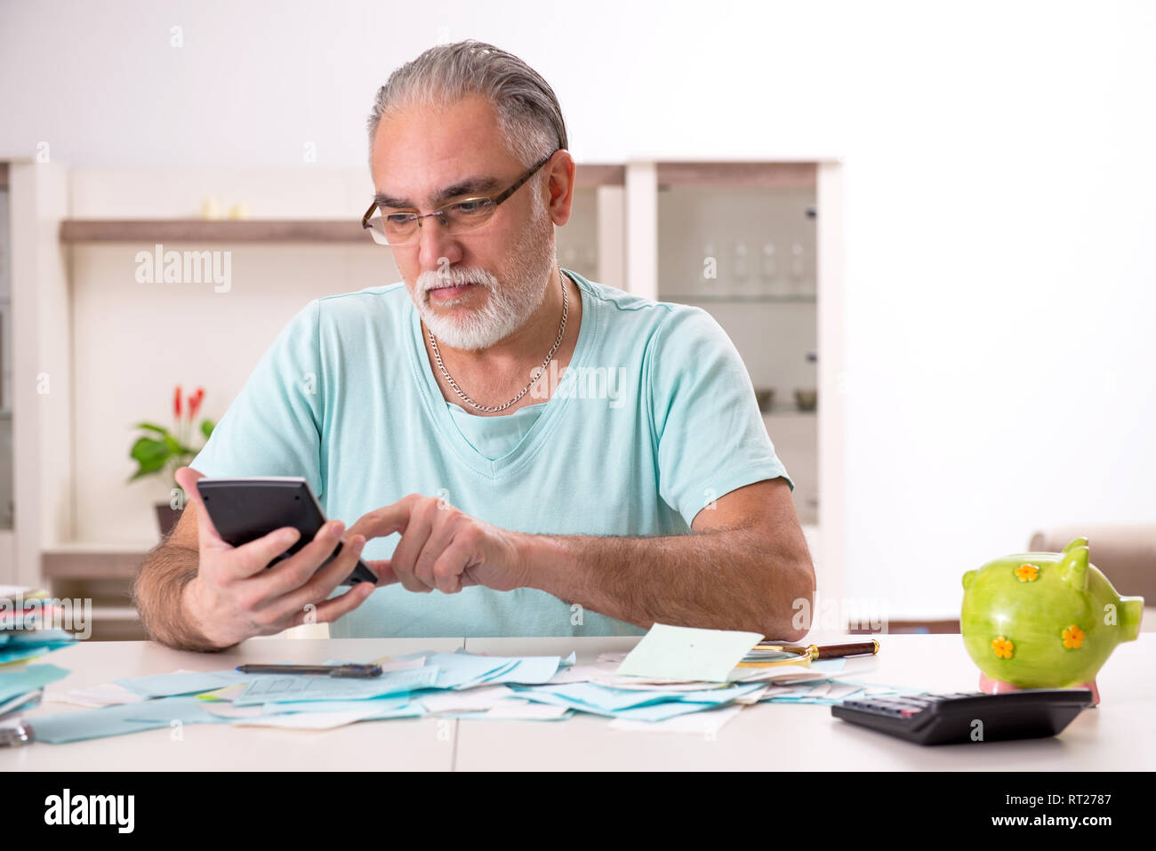 Planning family budget bearded senior hi-res stock photography and ...