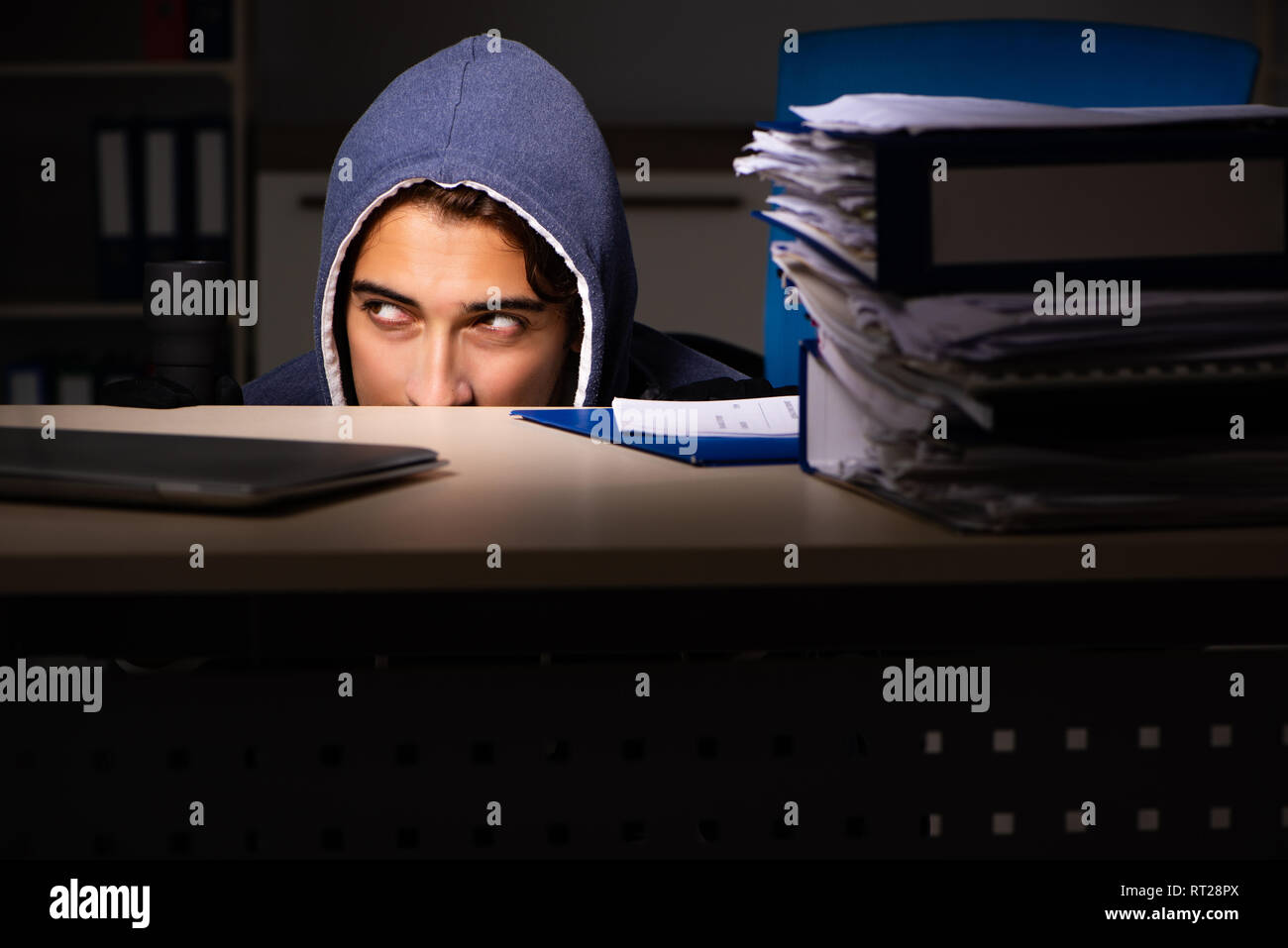 Thief trying to steal personal data in identity theft concept Stock ...