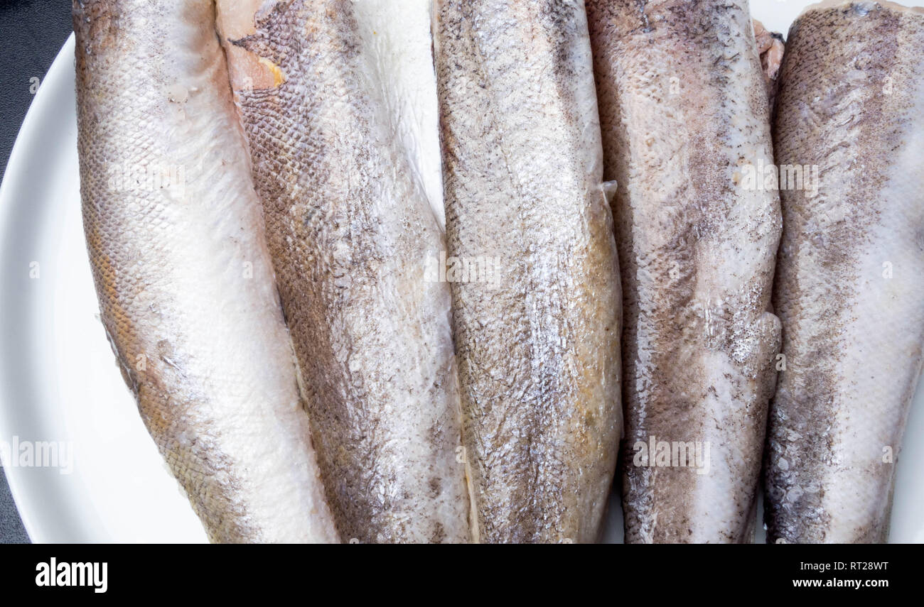 raw fish hake, healthy white fish concept Stock Photo - Alamy