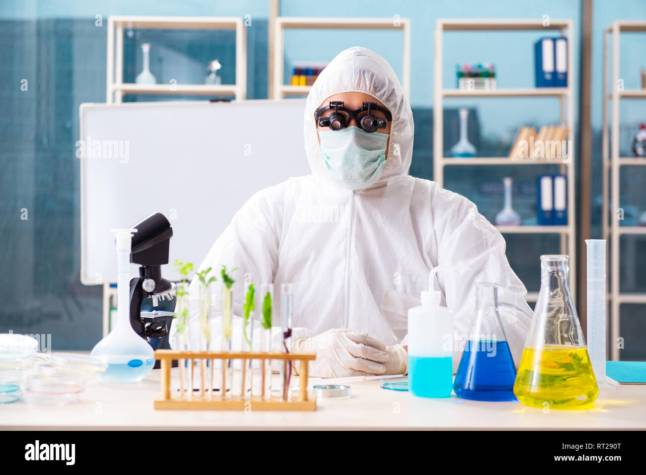 Male biotechnology scientist chemist working in the lab Stock Photo - Alamy