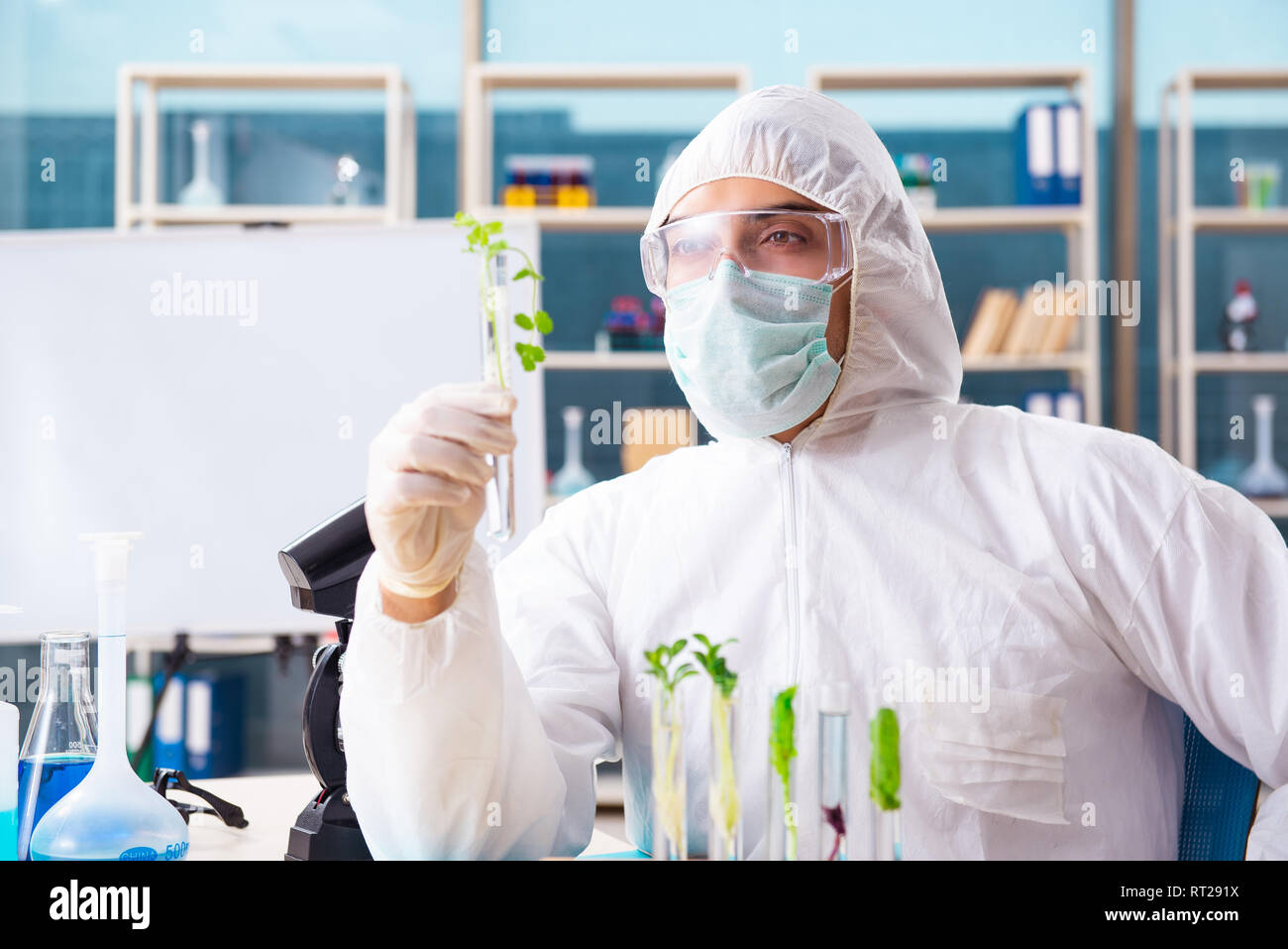 Male biotechnology scientist chemist working in the lab Stock Photo - Alamy