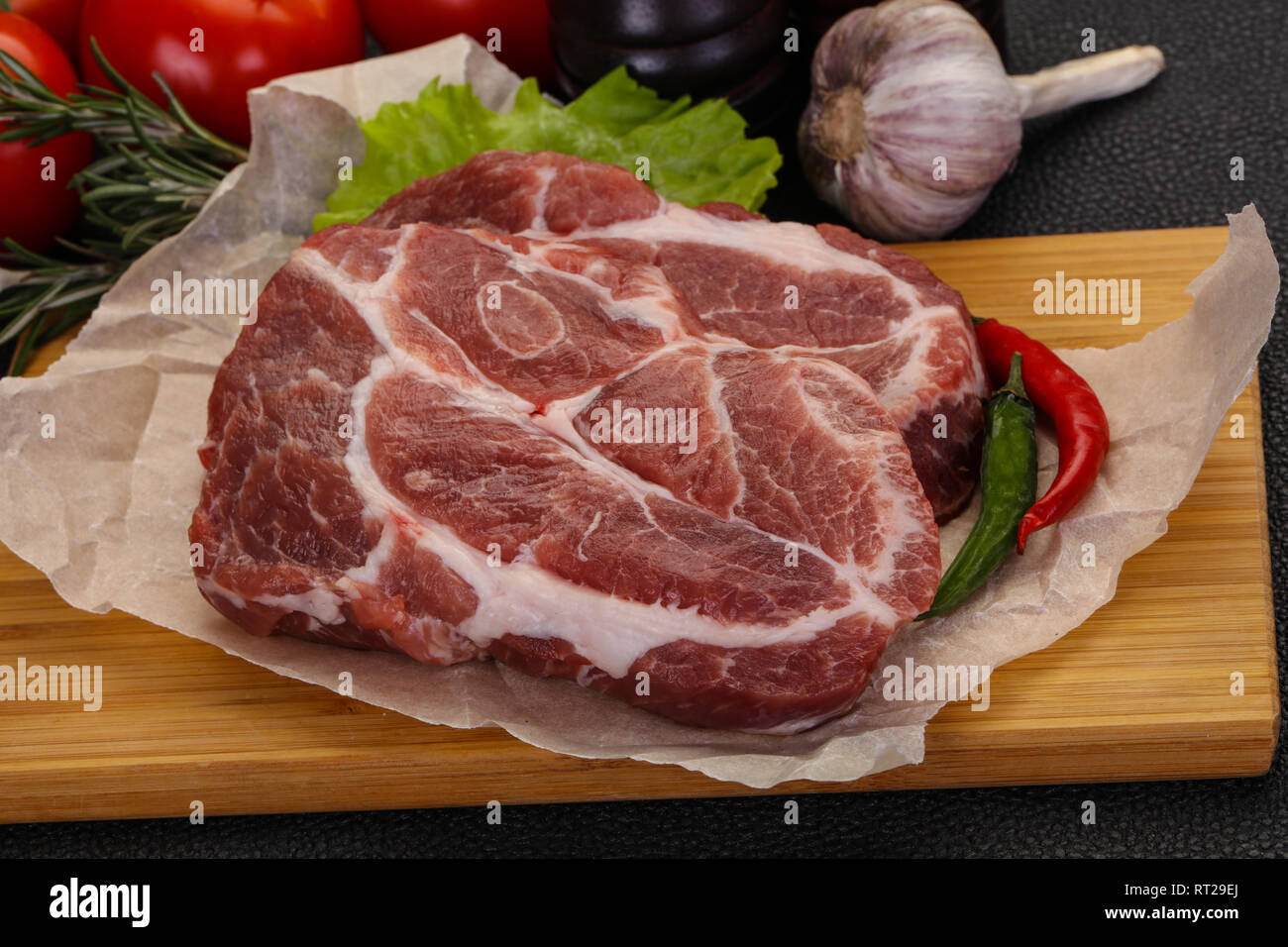 Raw pork neck steak ready for cooking Stock Photo - Alamy