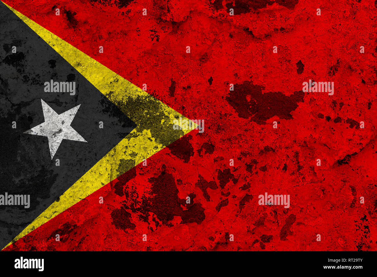 East Timor flag on old wall. Patriotic grunge background. National flag ...