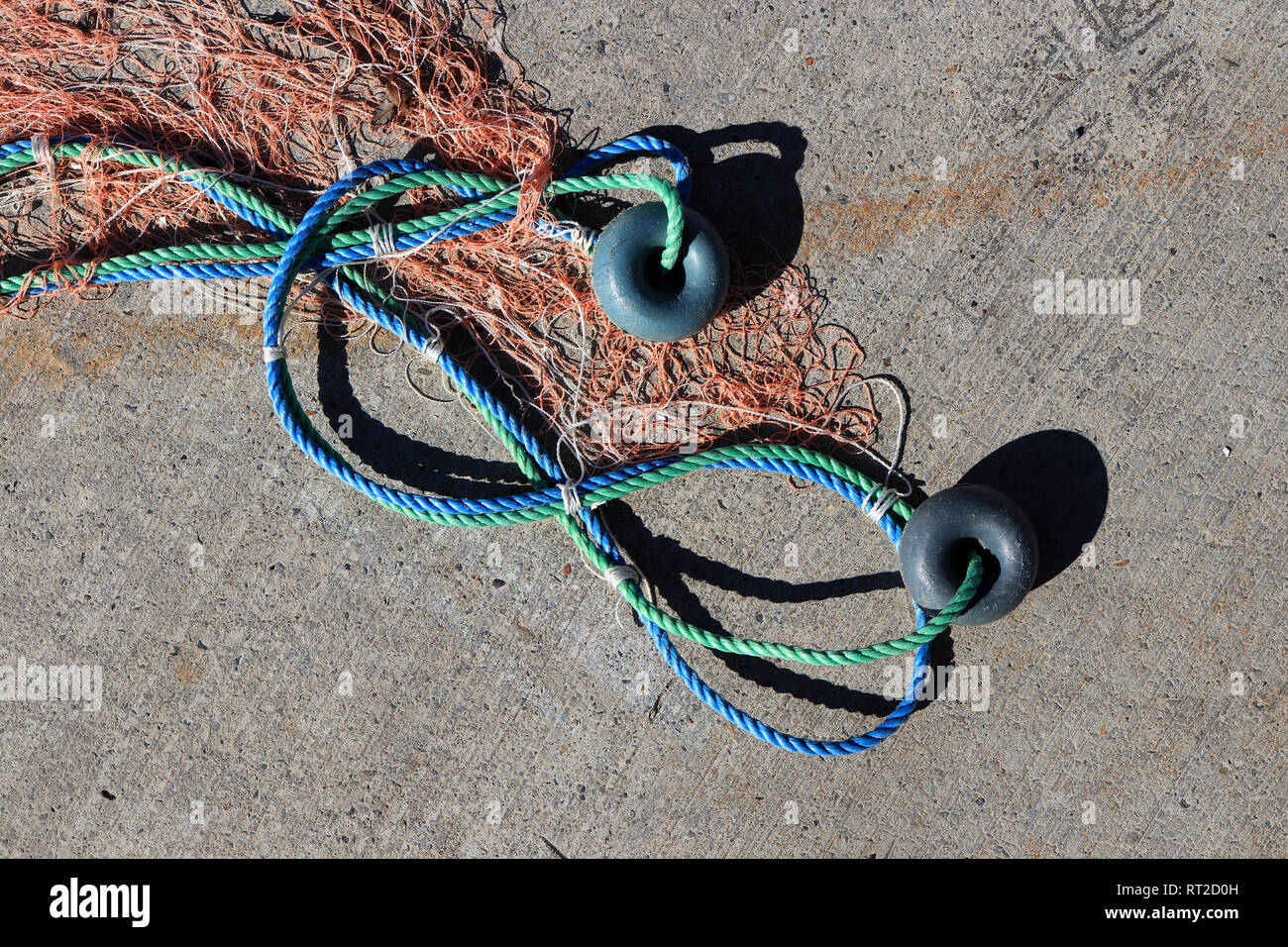 Fishnet with two buoys on rope. Nautical marine background Stock Photo ...