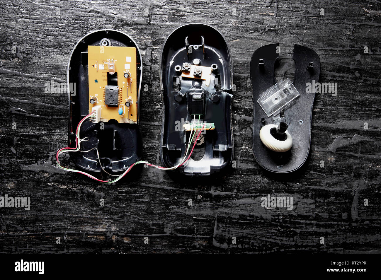 Broken Computer Mouse on Black Background Stock Photo - Alamy