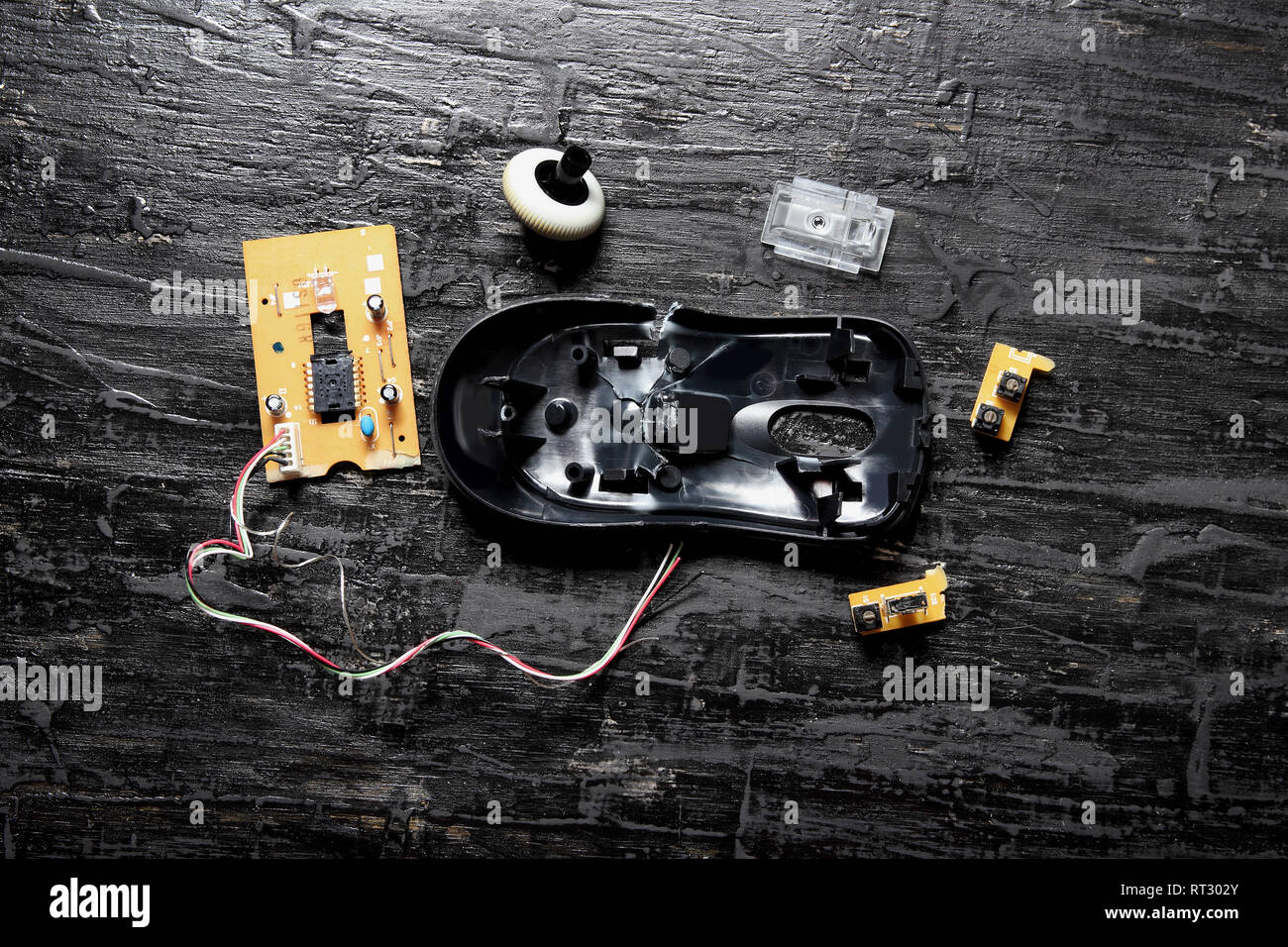 Broken Computer Mouse on Black Background Stock Photo - Alamy