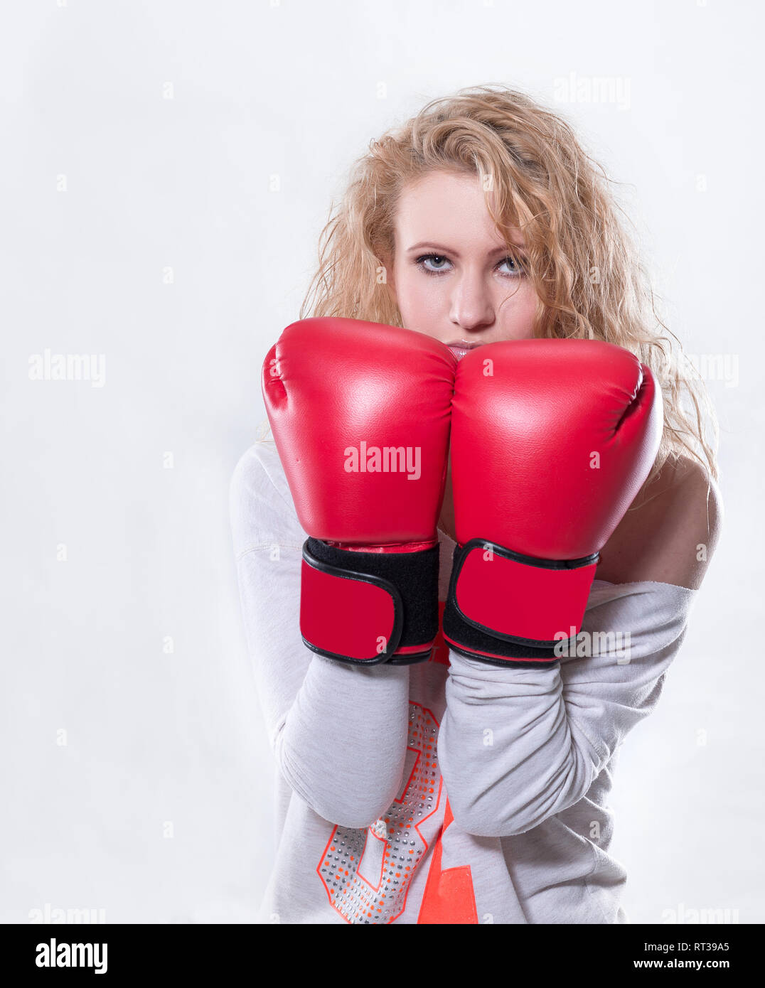 modern young woman in red Boxing gloves Stock Photo - Alamy