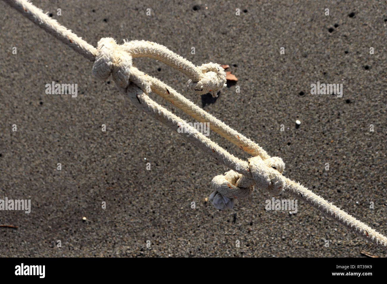 Rope with knots hi-res stock photography and images - Alamy