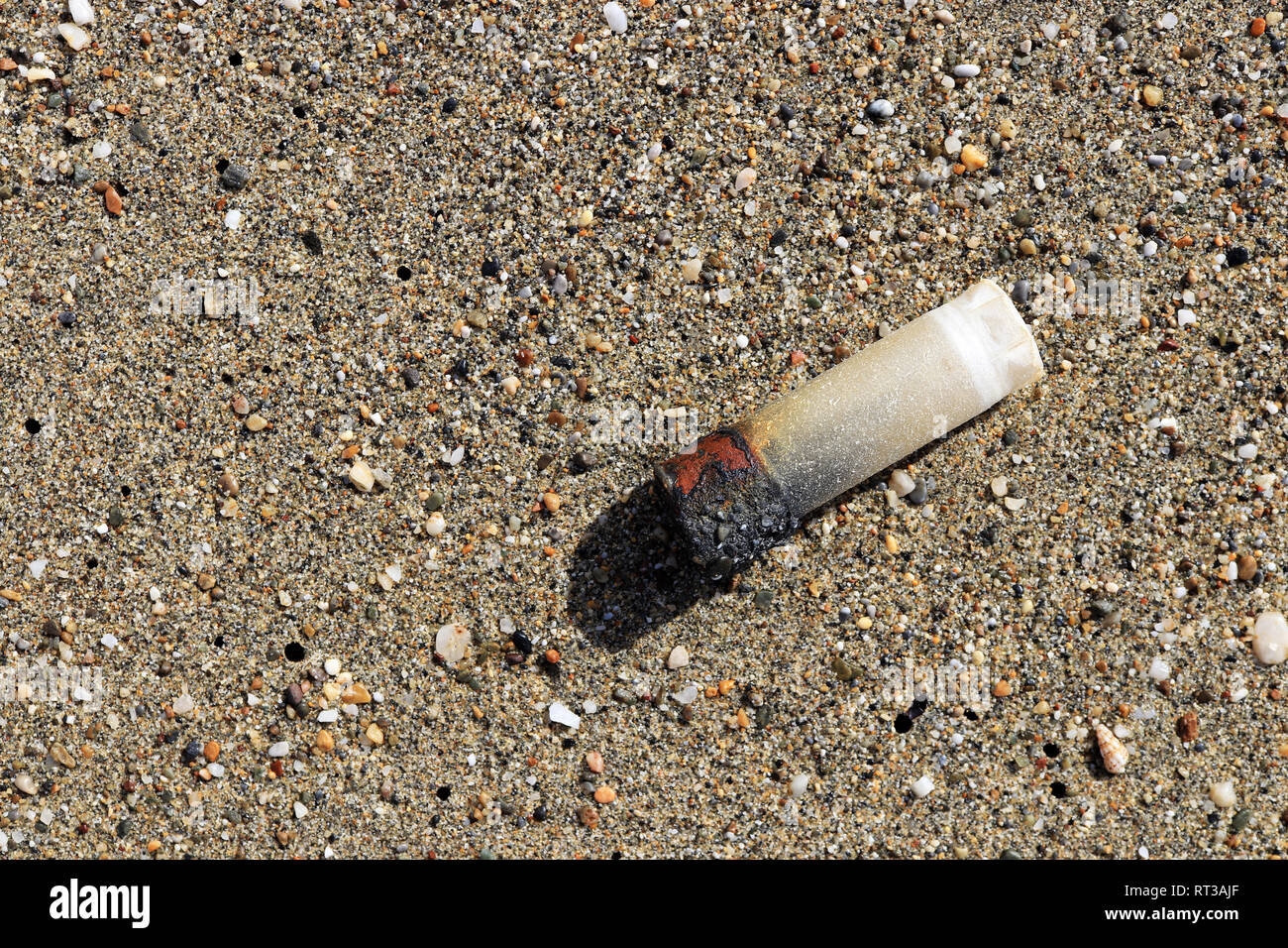 Old rusty empty patron on the sand texture. Summer beach background ...