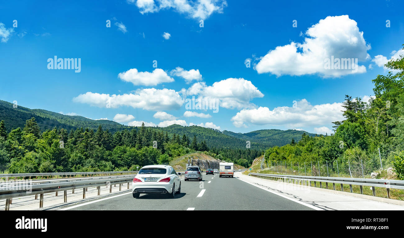 Cars moving on highway Stock Photo - Alamy