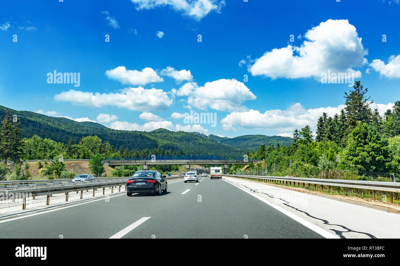 Cars moving on highway Stock Photo - Alamy