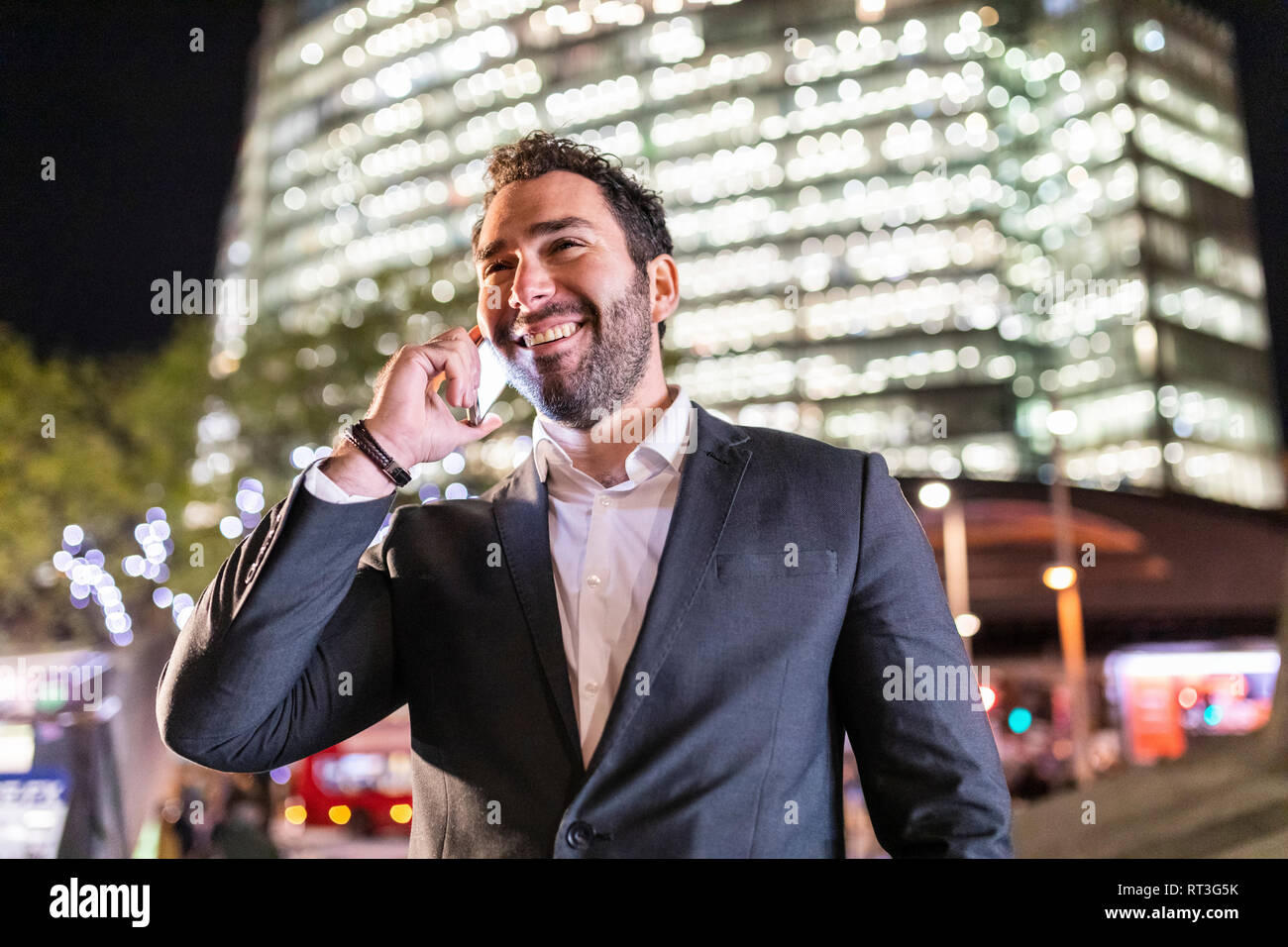 Night portrait suit smiling hi-res stock photography and images - Alamy
