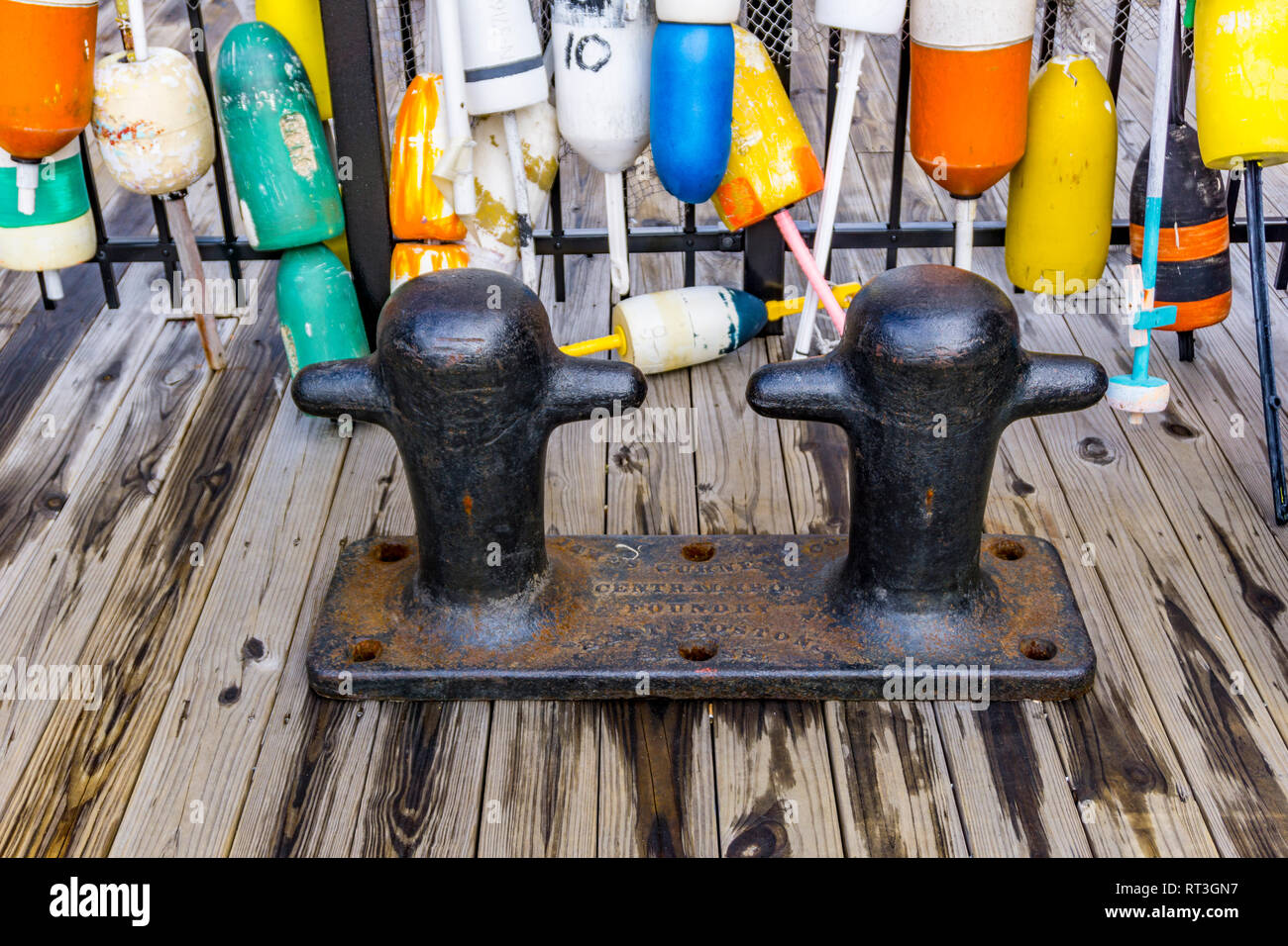 A mooring bollard and floats on a dock in Boston Massachusetts USA ...
