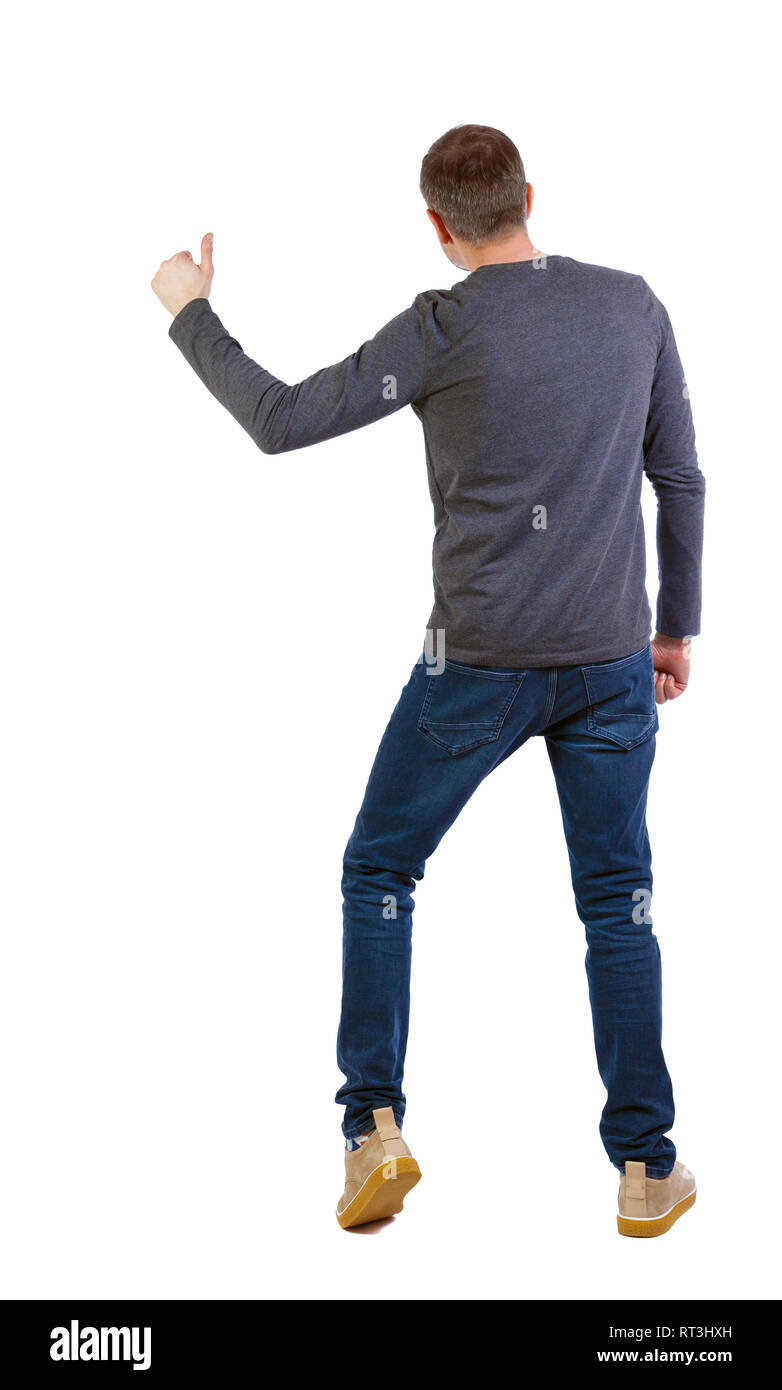 Back view of a man showing thumb up. Rear view people collection ...