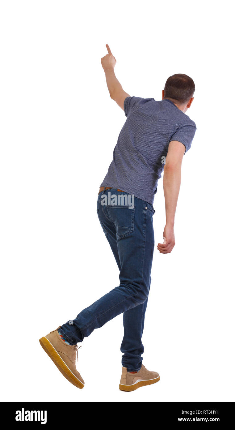 Back view of a man running and pointing his hand. walking young guy ...