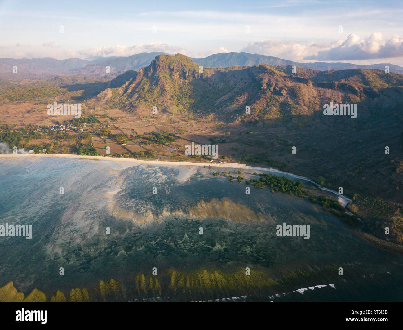 Indonesia, West Sumbawa, Aerial view of Jelengah beach, Scar reef surf ...