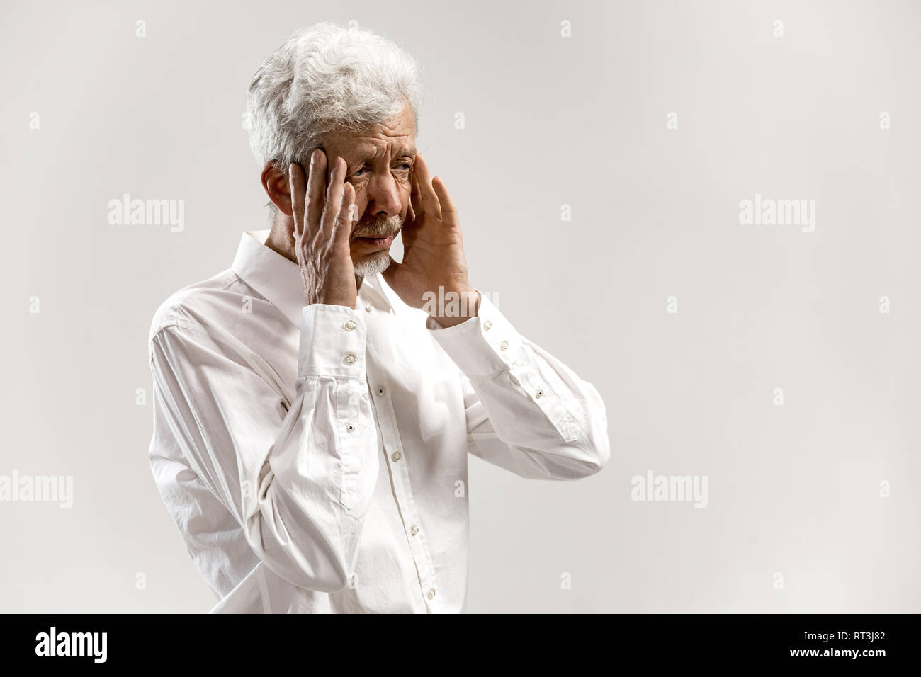 Man having headache. Business man standing with stress isolated on ...