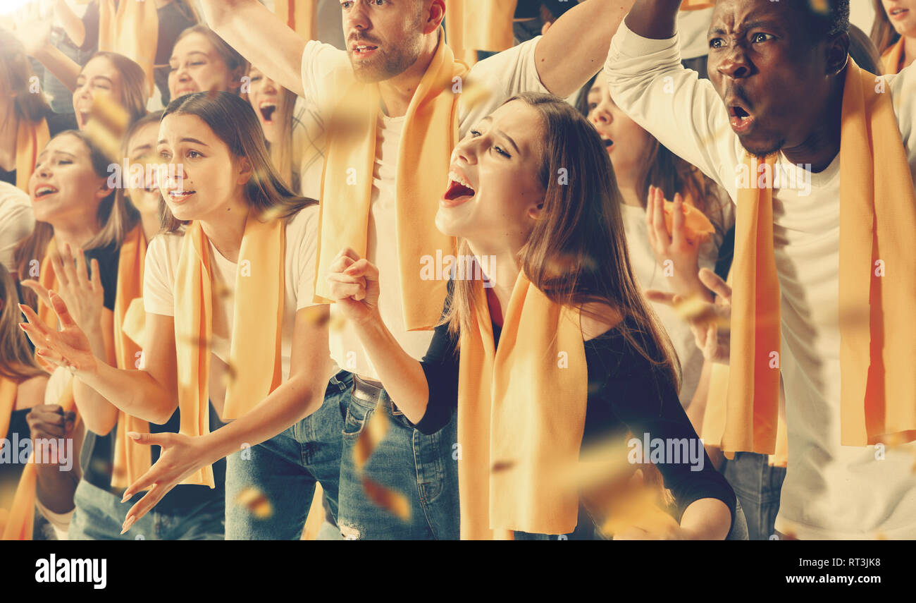 Group of happy fans are cheering for their team victory Stock Photo - Alamy