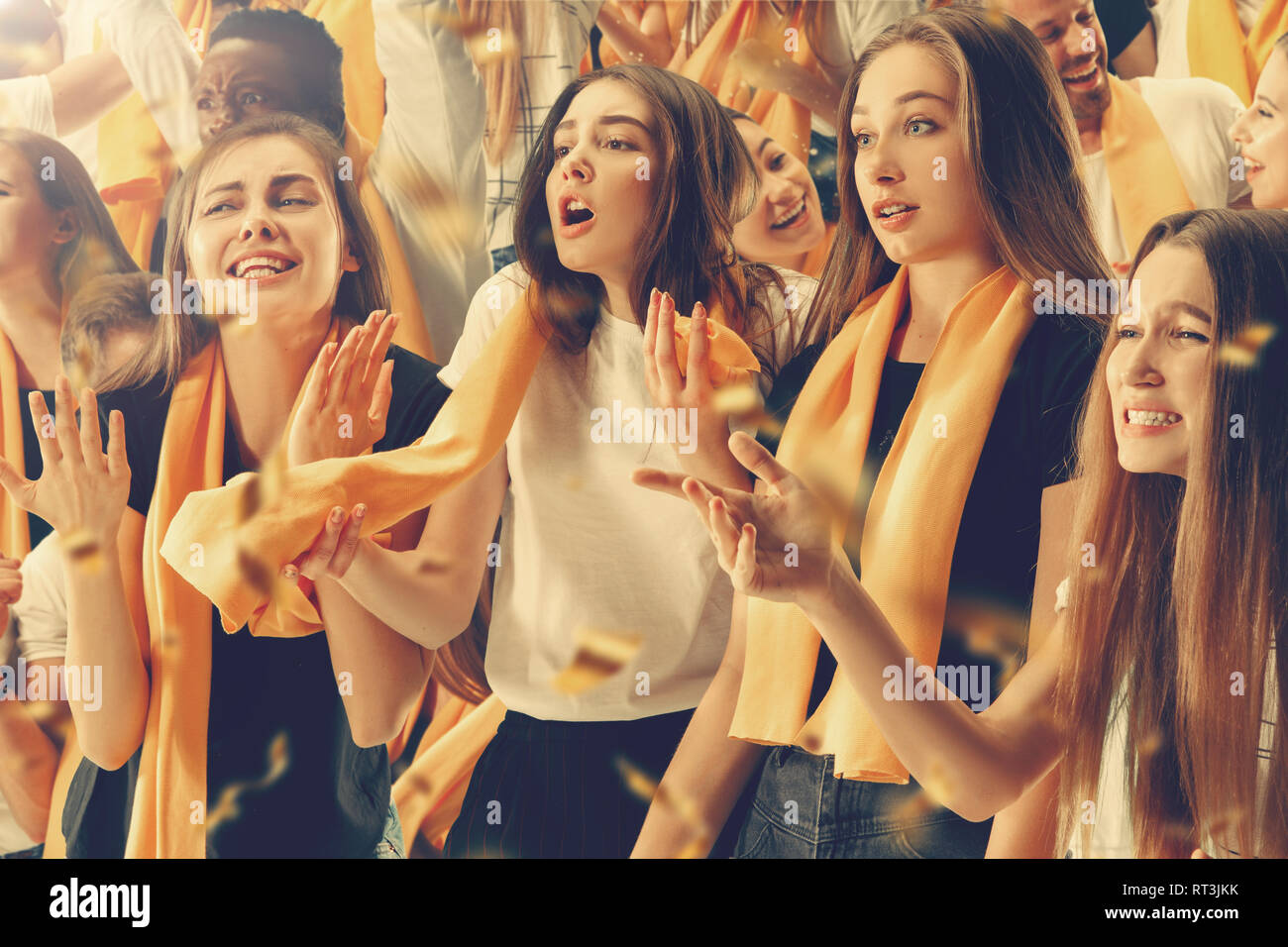 Group of happy fans are cheering for their team victory Stock Photo - Alamy