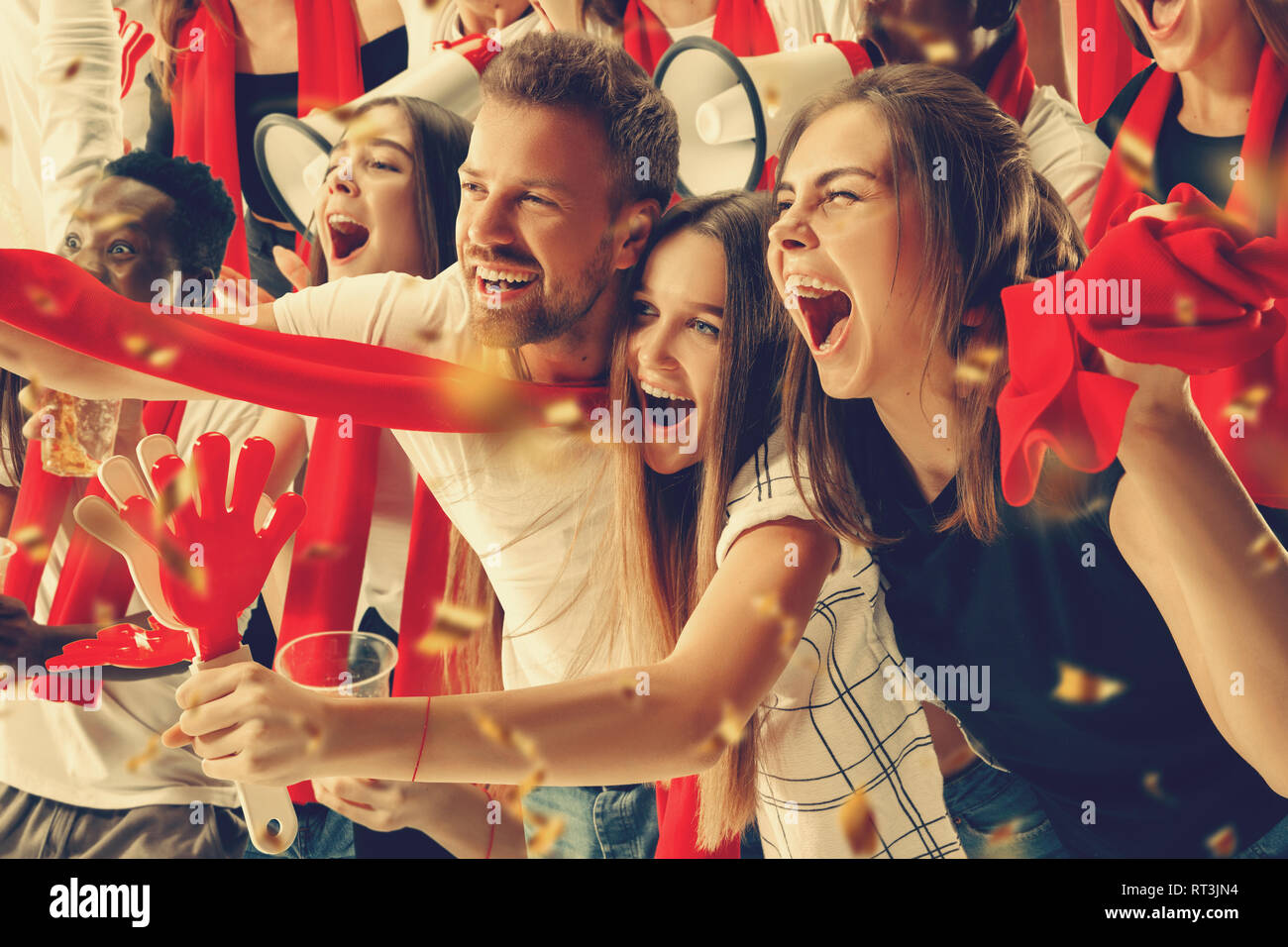 Group of happy fans are cheering for their team victory Stock Photo - Alamy