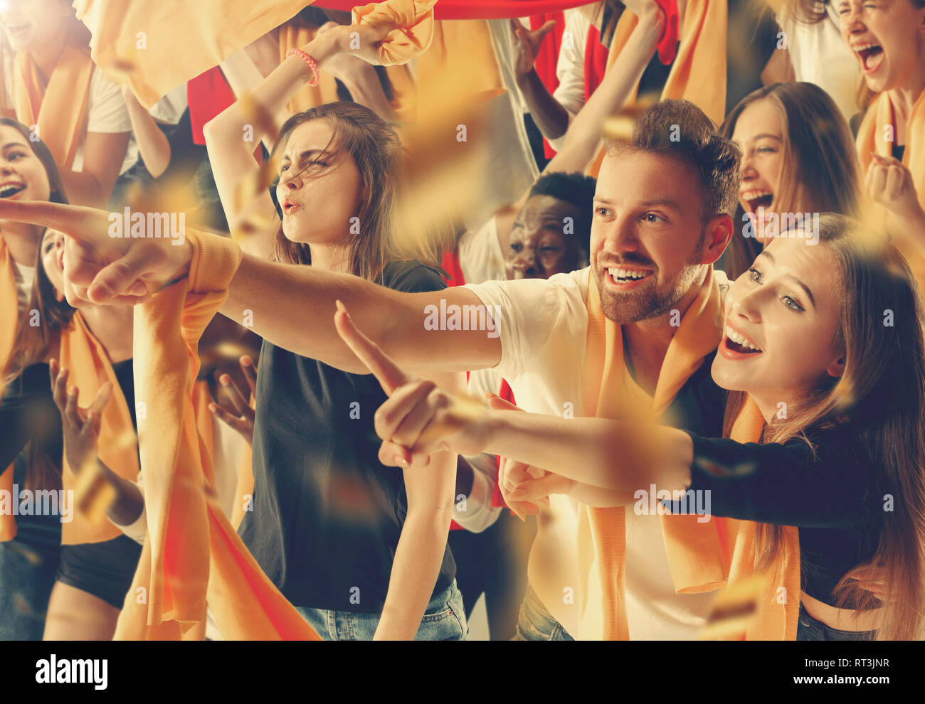 Group of happy fans are cheering for their team victory Stock Photo - Alamy