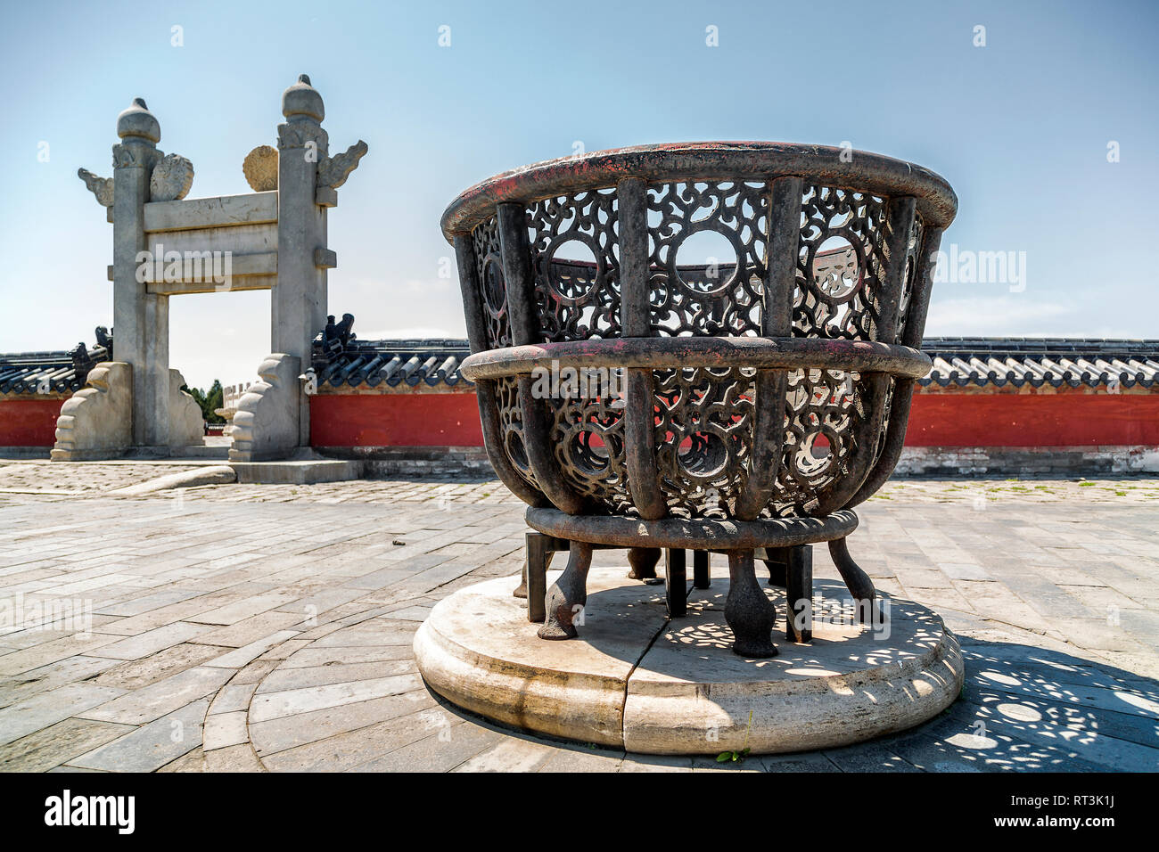 A large ornate metal stove or fire pit standing outside Lingxing Gate ...