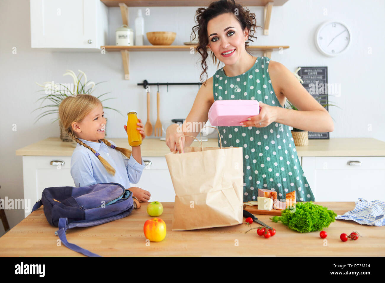 Mother lunch box school girl hi-res stock photography and images - Alamy