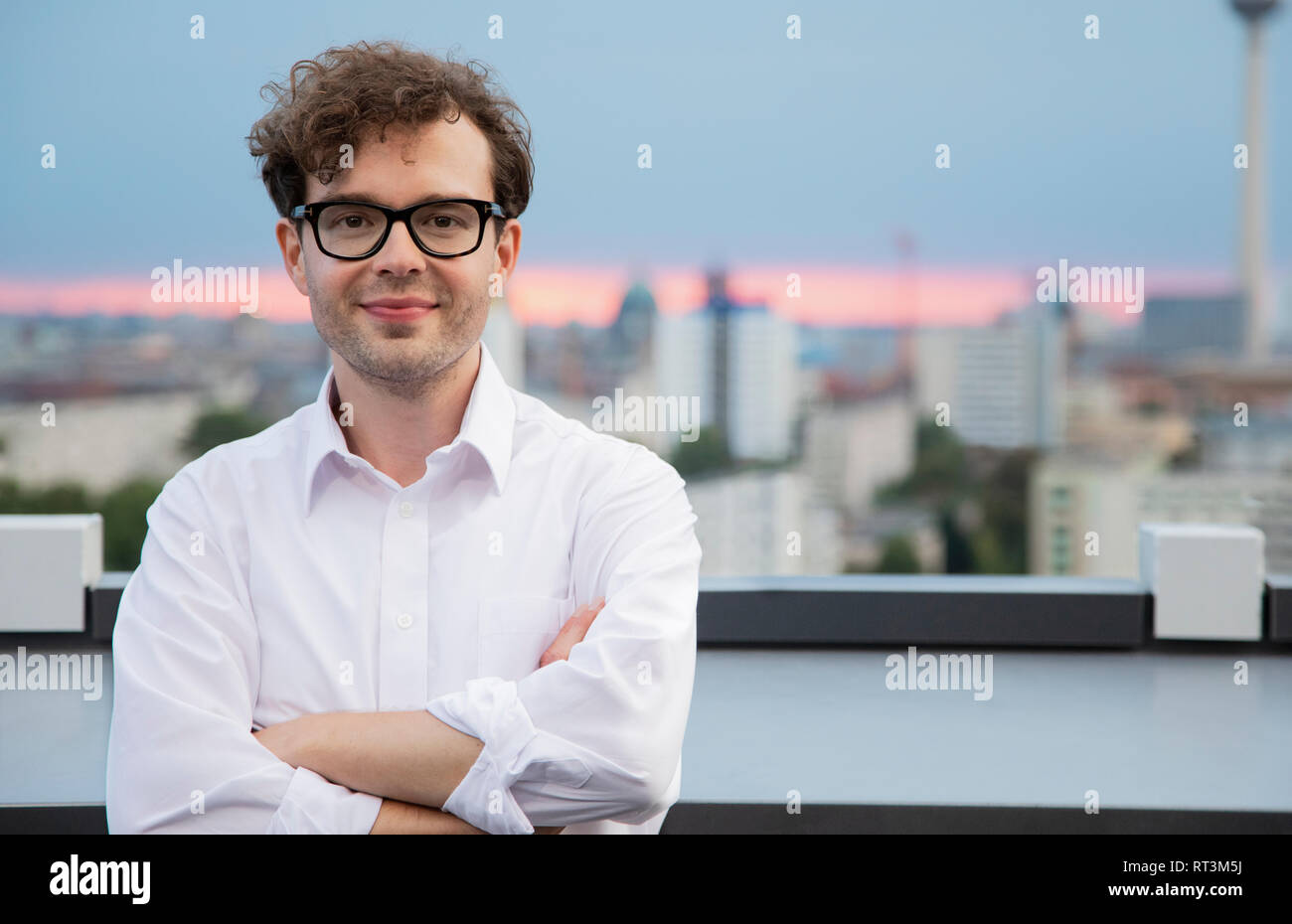 Portrait successfull businessman roof terrace sunset hi-res stock ...
