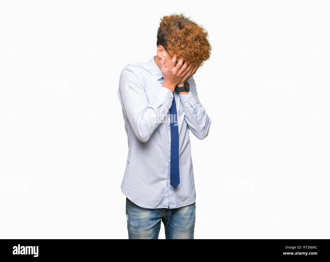 Young handsome business man with afro wearing glasses with sad ...
