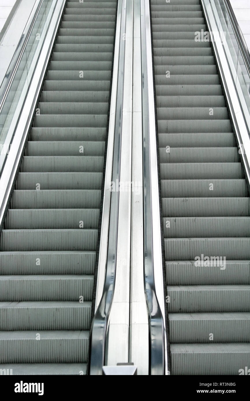 Two parallel automatic escalators close up shot Stock Photo - Alamy